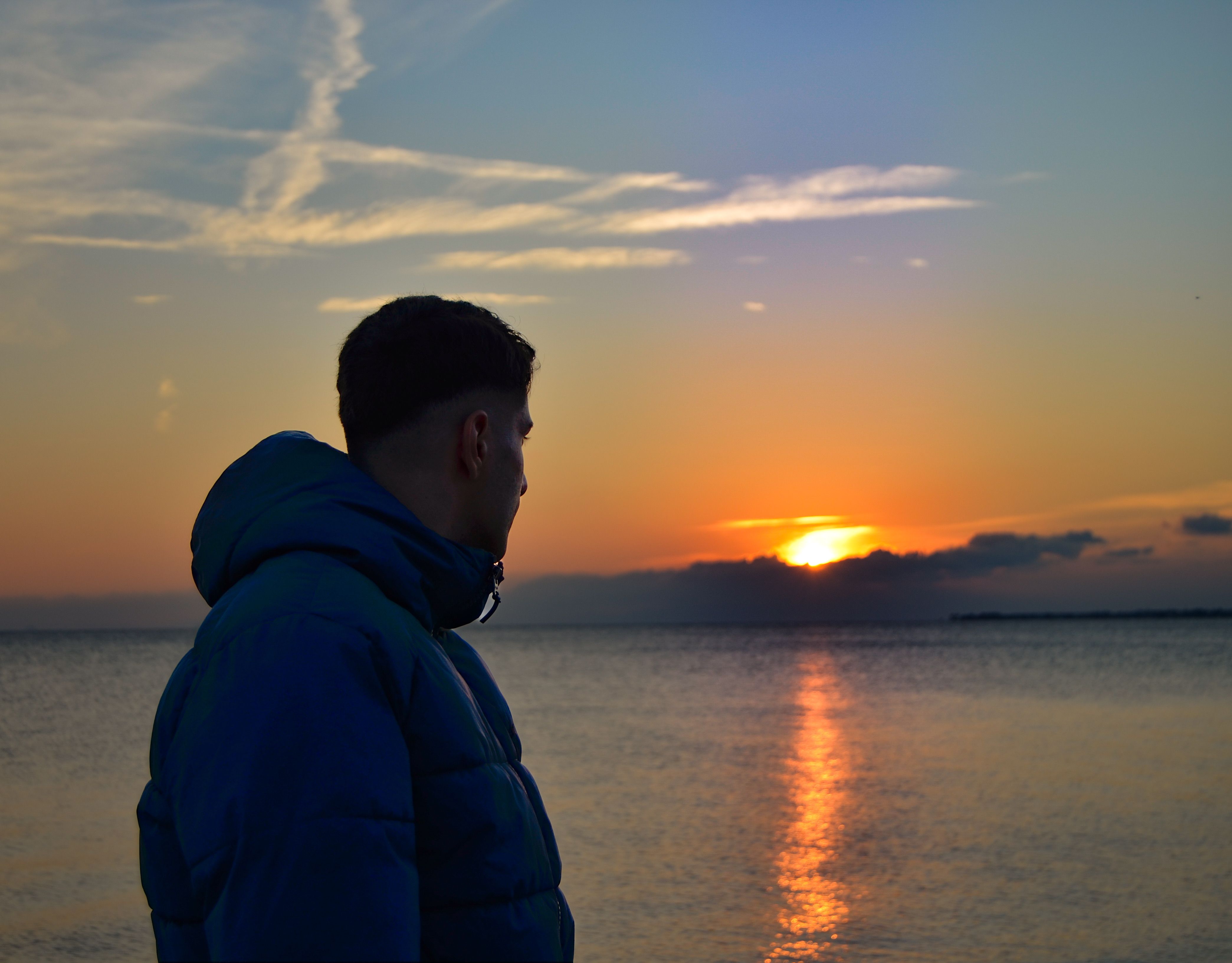 Silhouette of Man during Golden Hour · Free Stock Photo