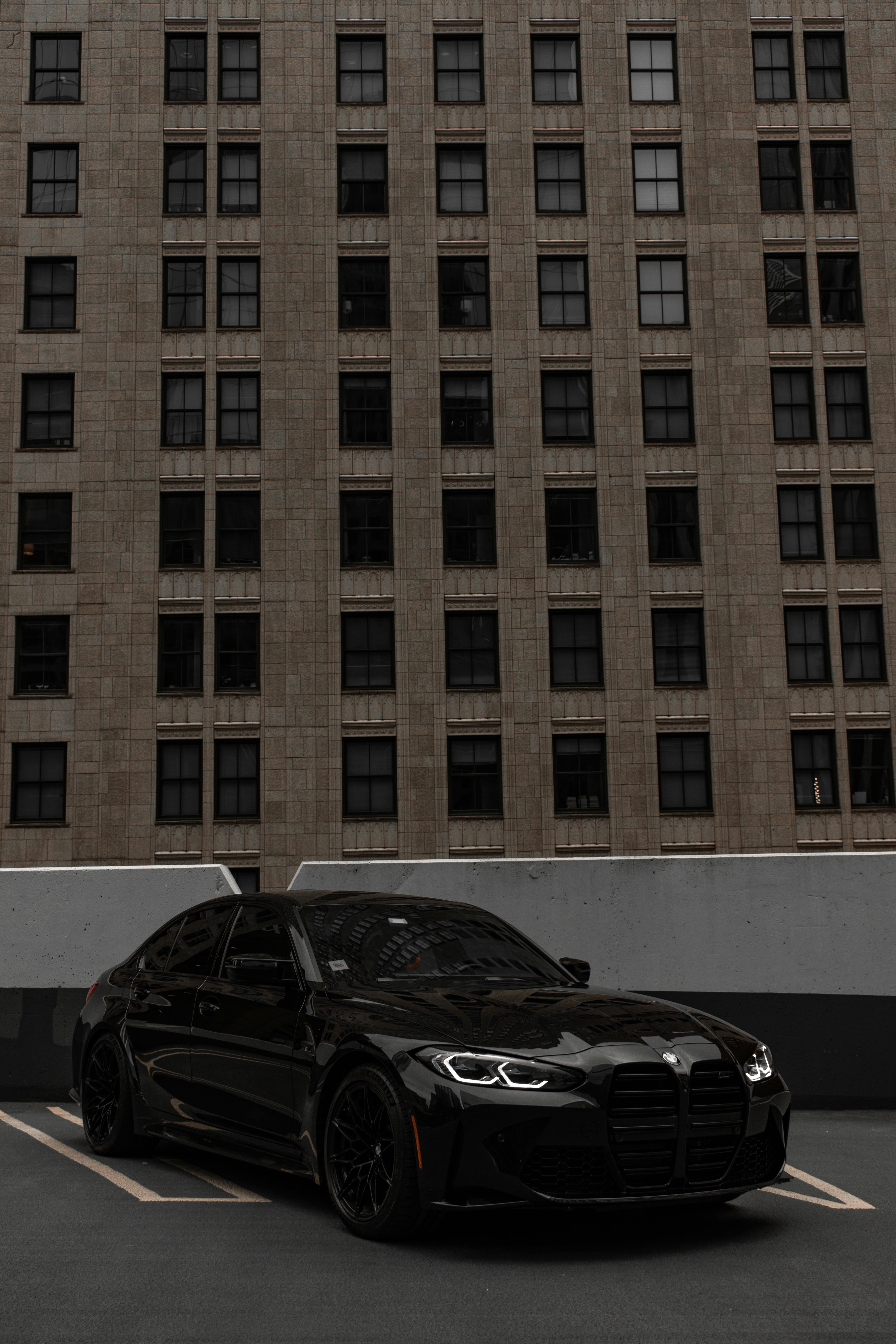 Sleek Black Car in Urban Chicago Setting · Free Stock Photo