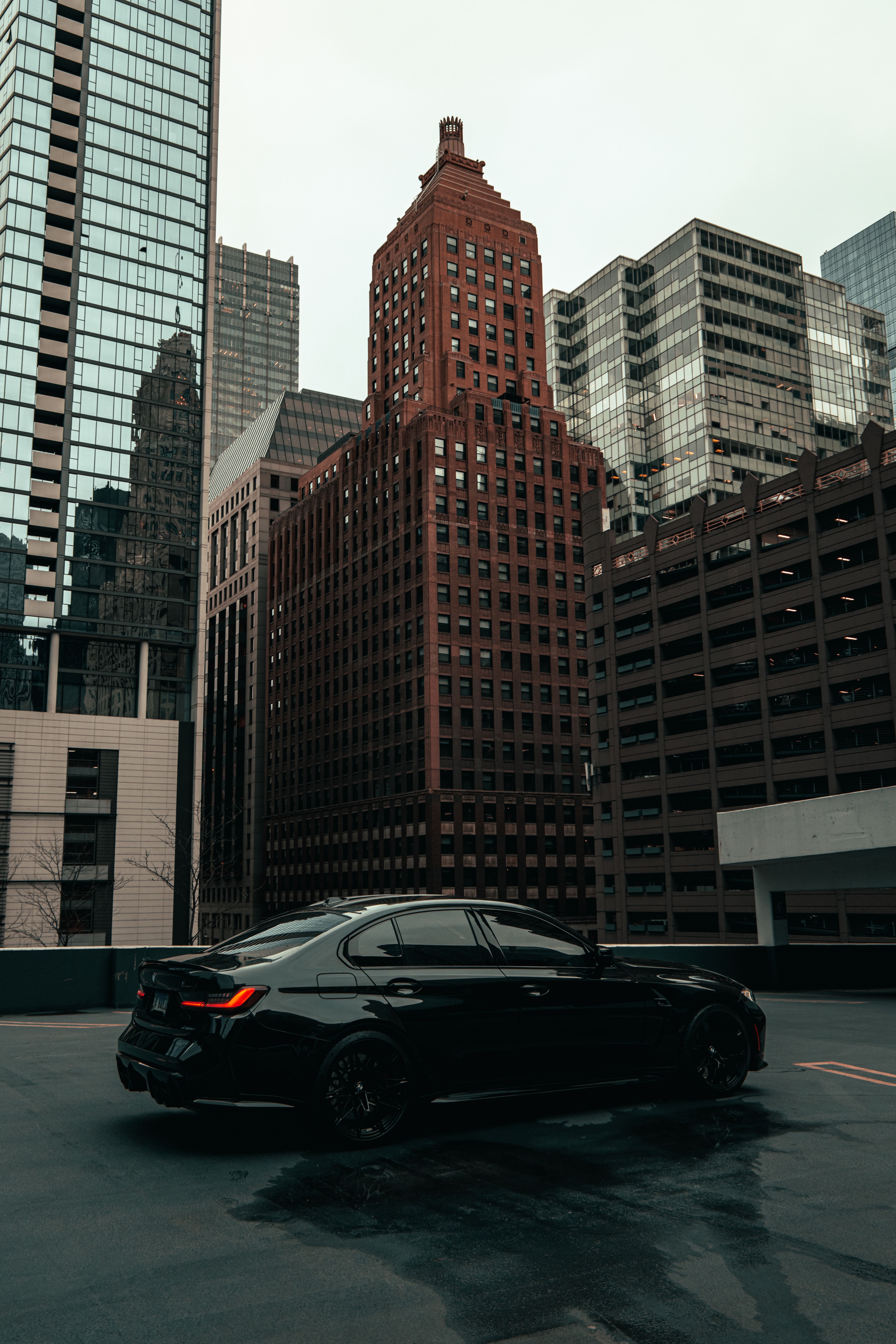 Sleek Black BMW in Chicago Urban Setting · Free Stock Photo