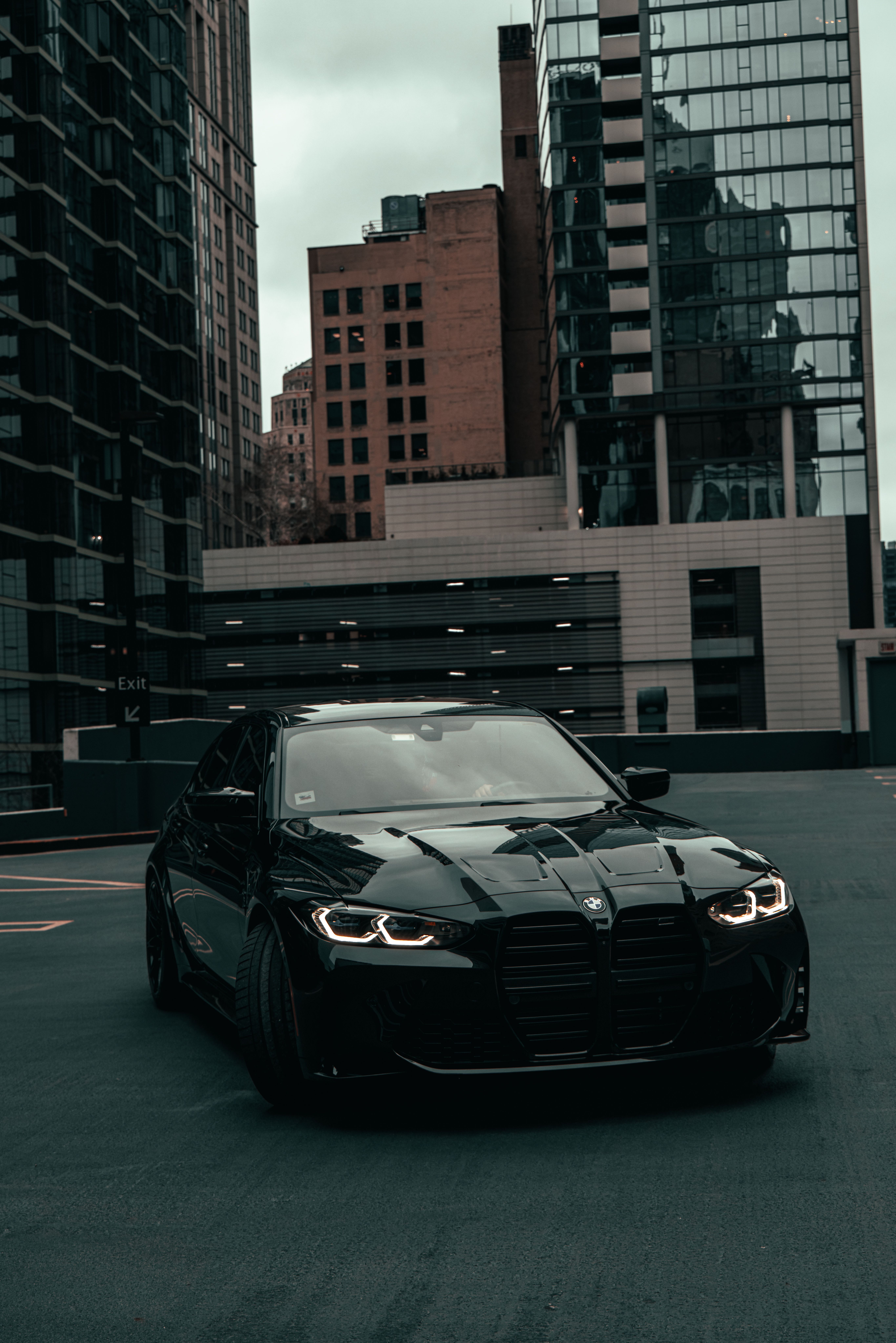 Sleek Black BMW in Chicago Urban Setting · Free Stock Photo