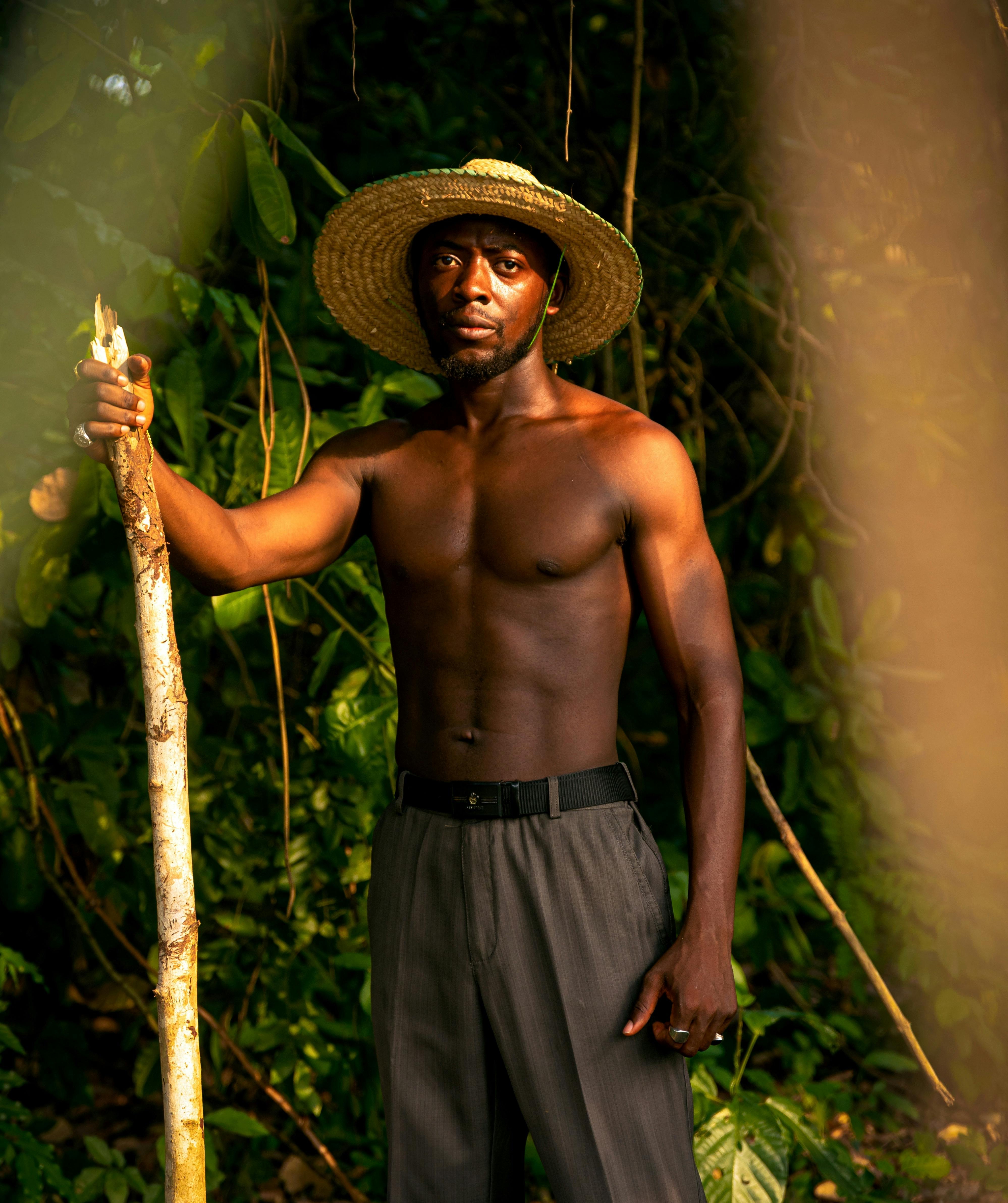 Portrait of Man in Jungle with Straw Hat · Free Stock Photo