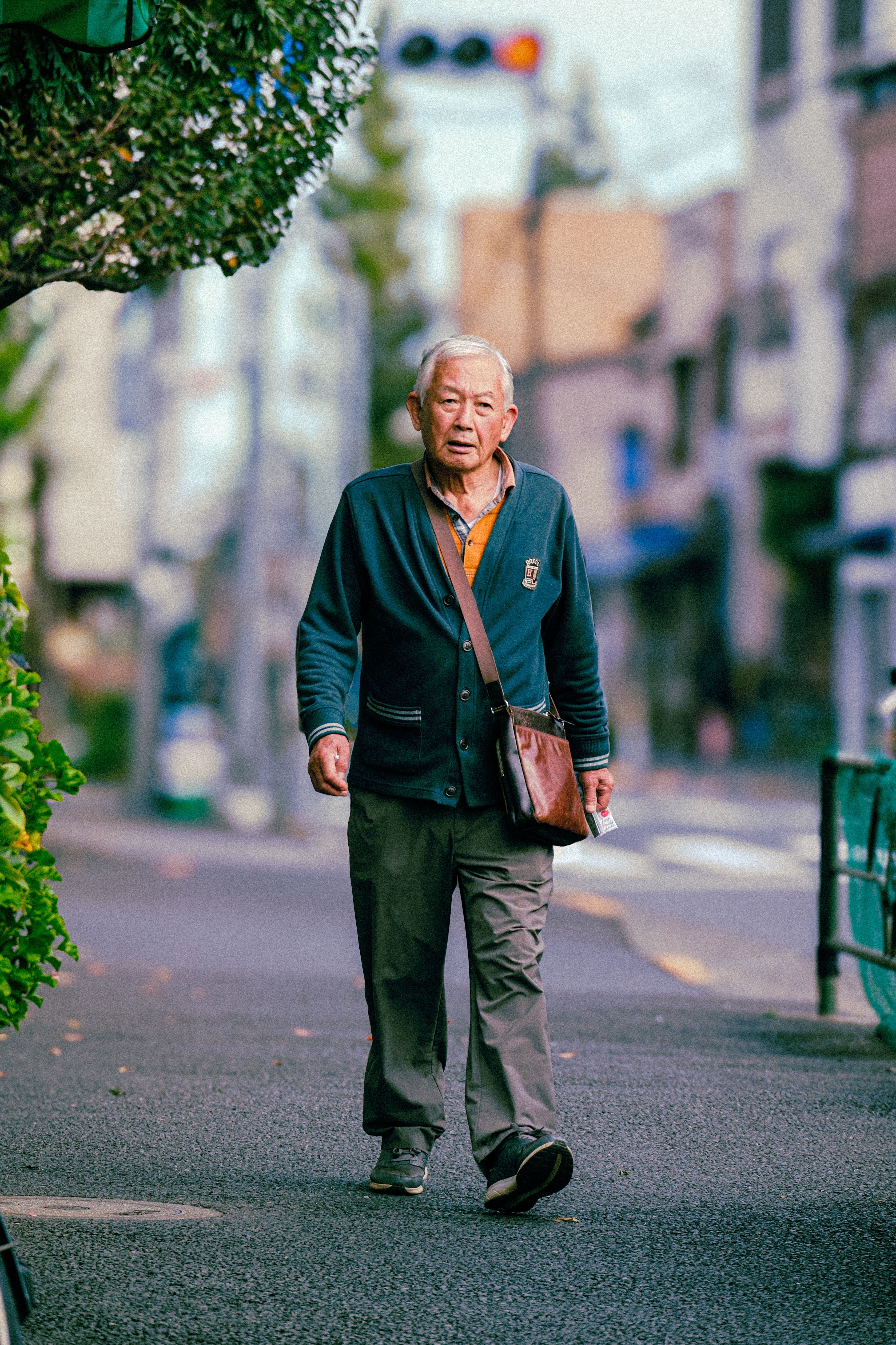 Elderly Man Walking in Tokyo Neighborhood · Free Stock Photo