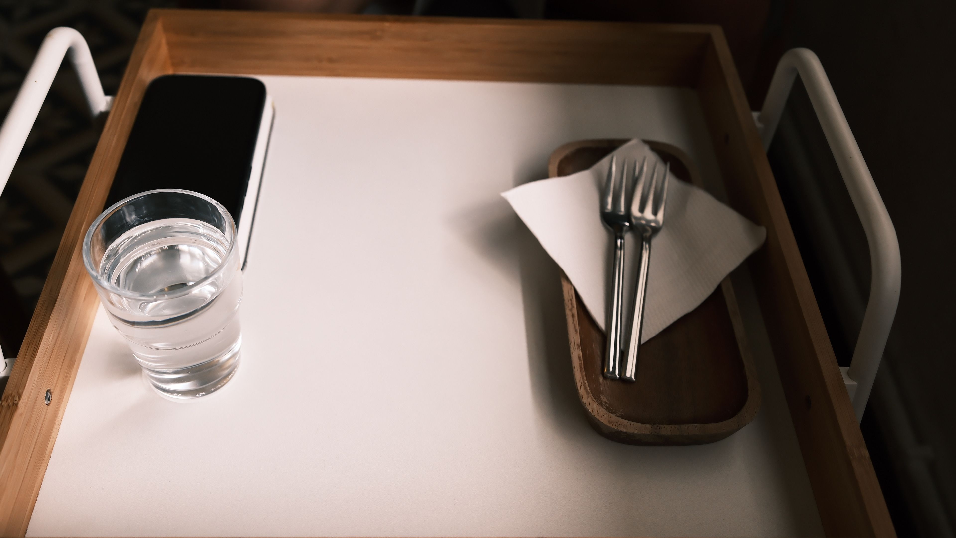 Minimalist Tray Setup with Water and Utensils · Free Stock Photo