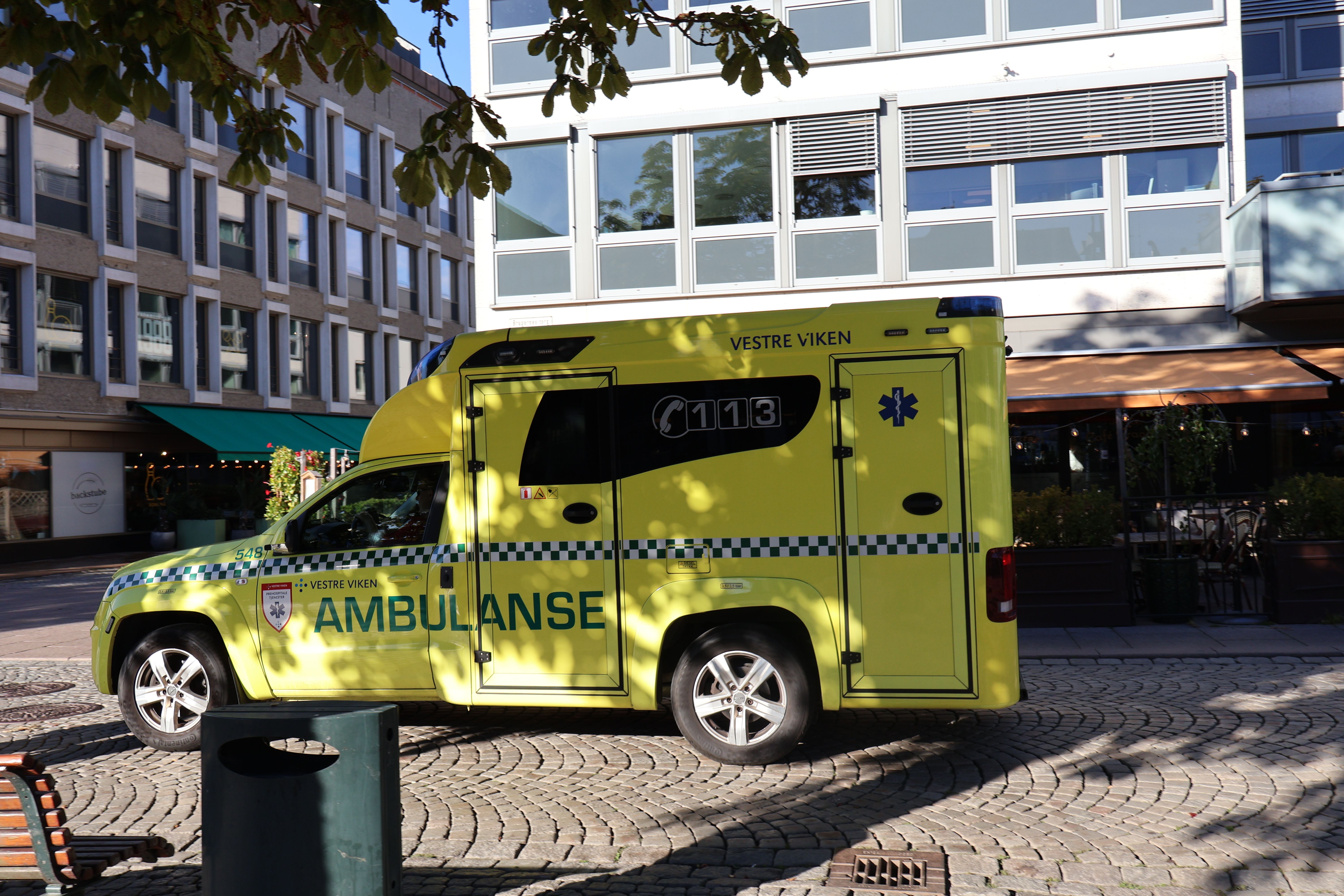 Yellow Ambulance in Drammen Street Scene · Free Stock Photo