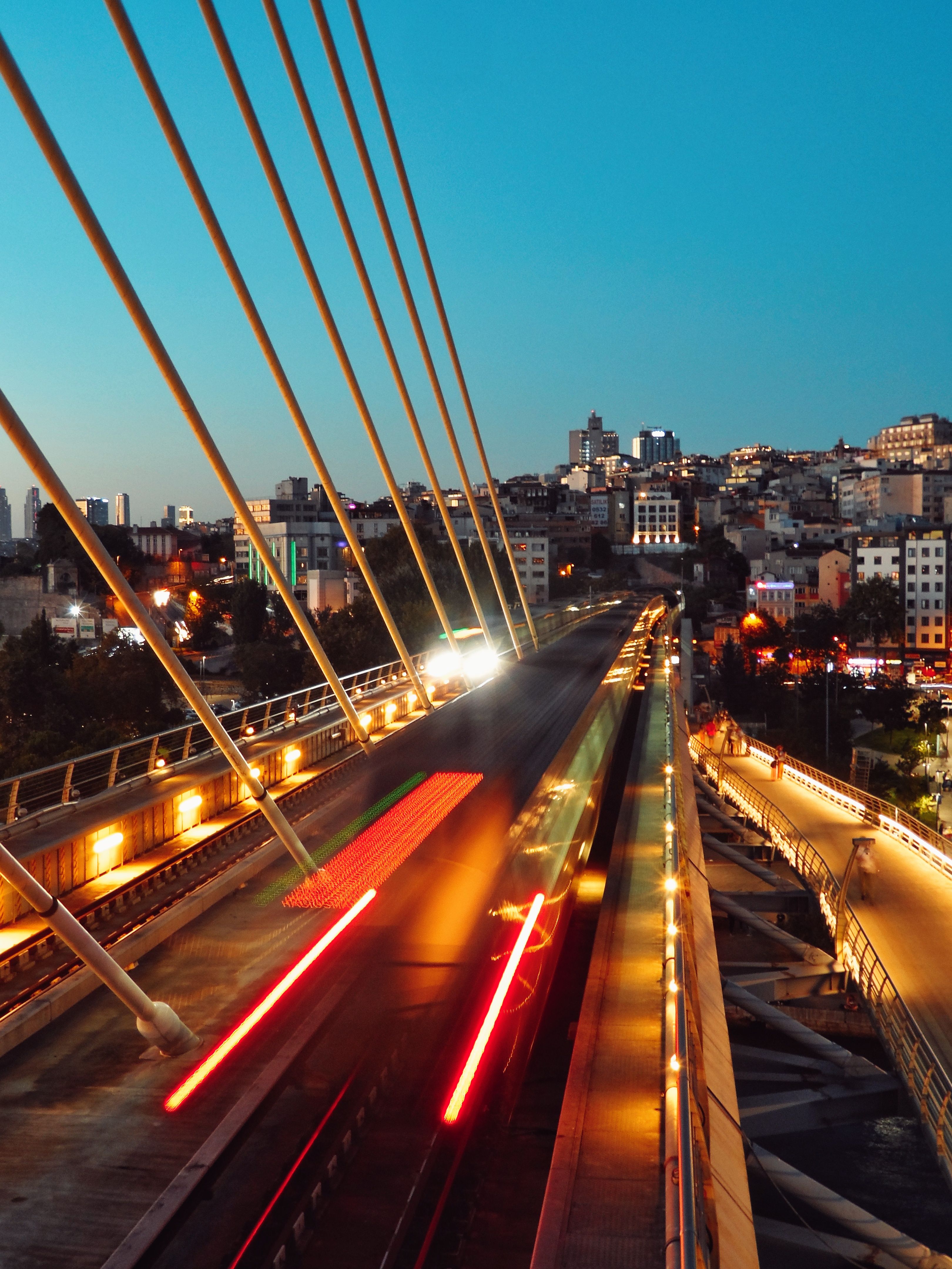 Dynamic City Bridge at Dusk with Light Trails · Free Stock Photo