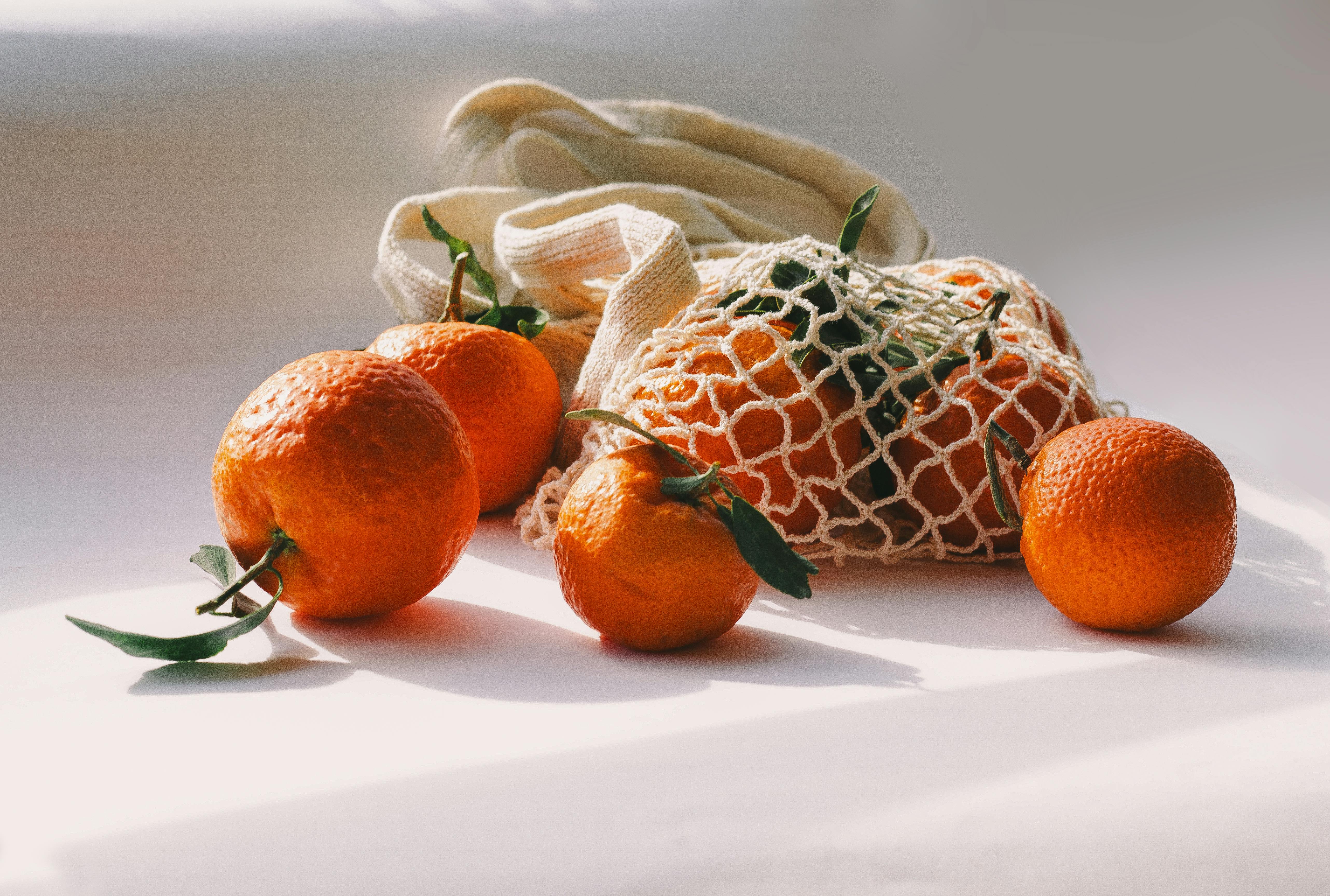 Fresh Mandarins in Eco-friendly Mesh Bag · Free Stock Photo