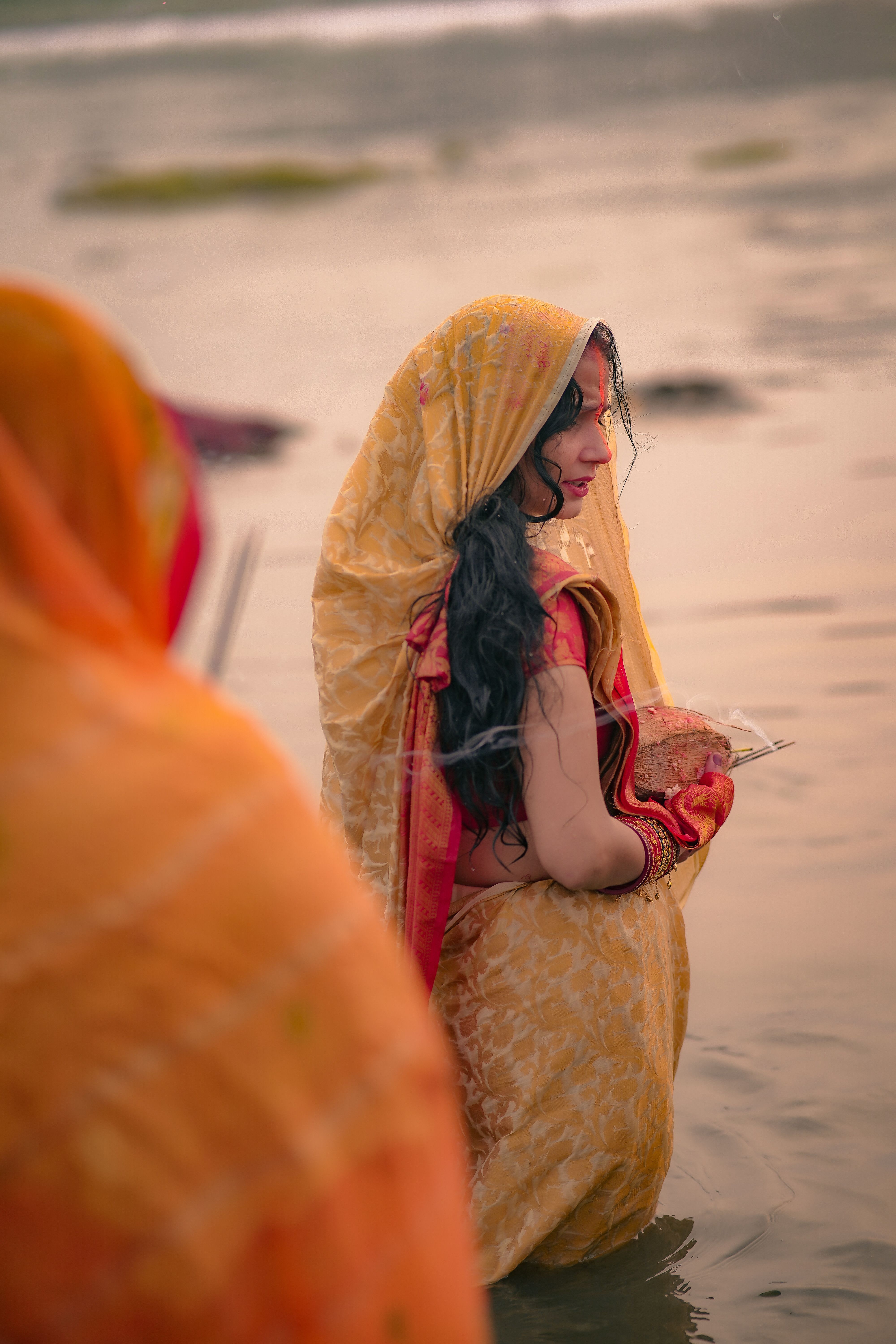 Woman in Traditional Saree Participating in Ritual · Free Stock Photo