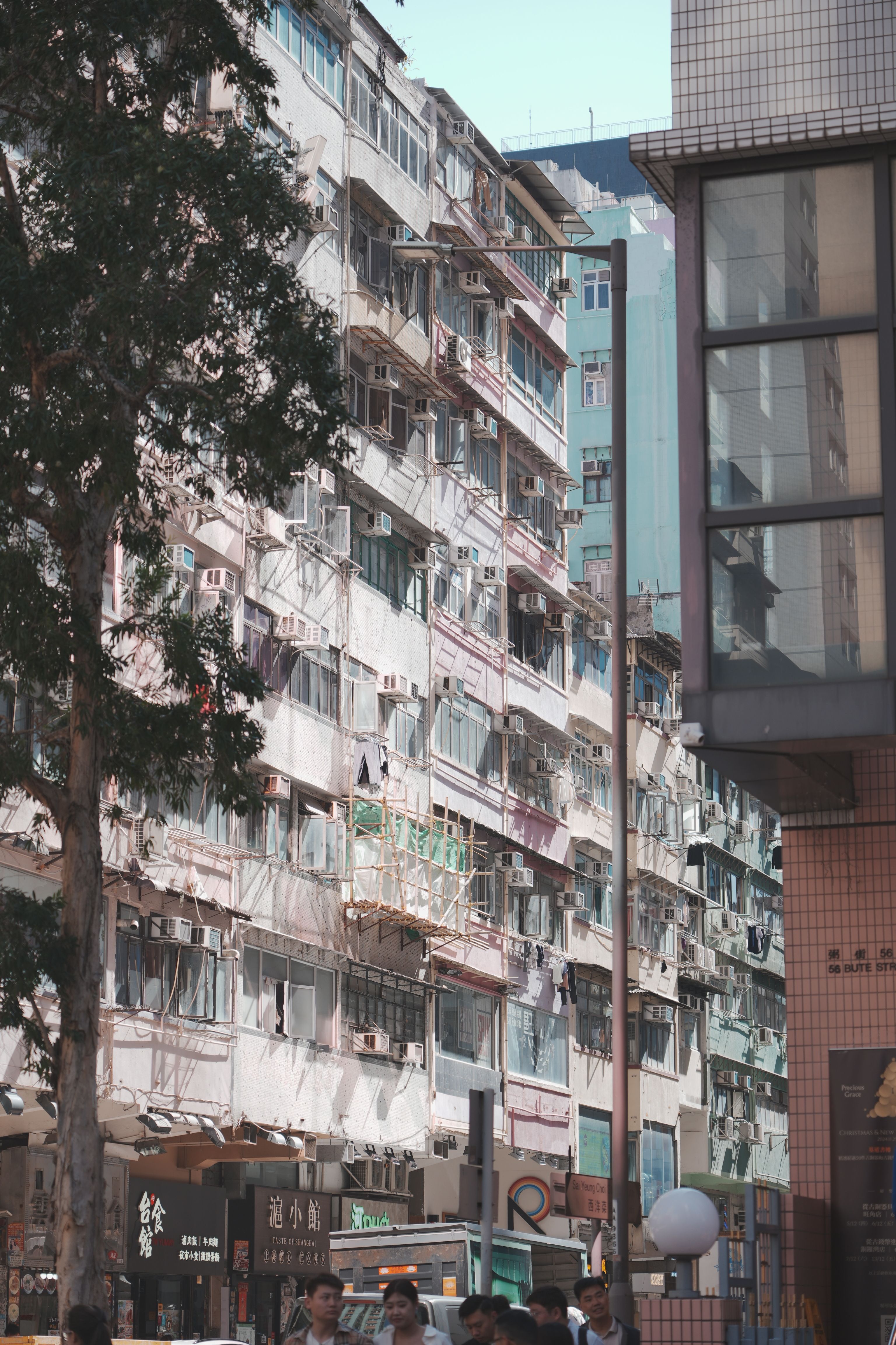 Busy Urban Street with Old Apartment Buildings · Free Stock Photo