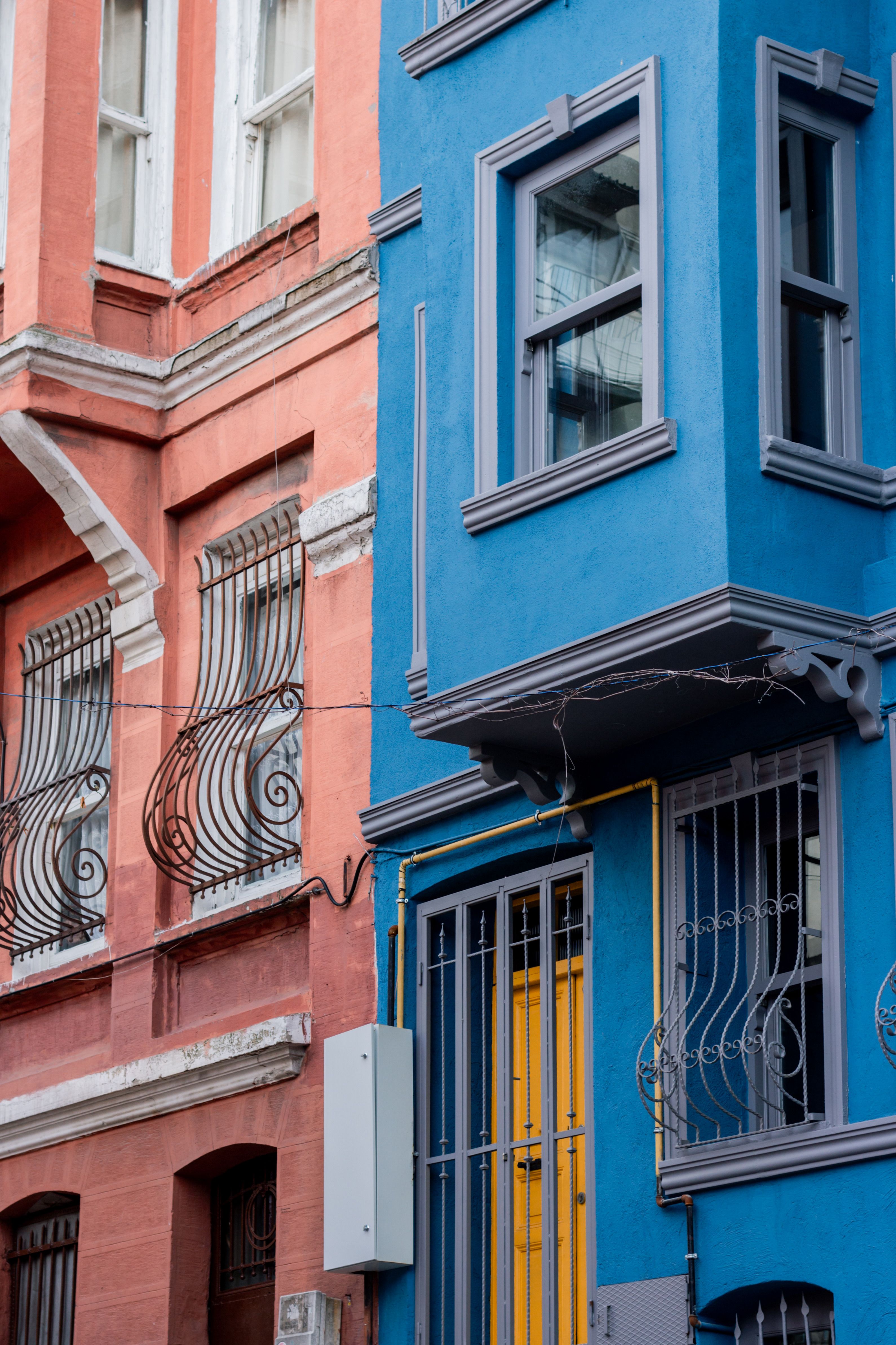 Colorful Architecture with Red and Blue Facades · Free Stock Photo