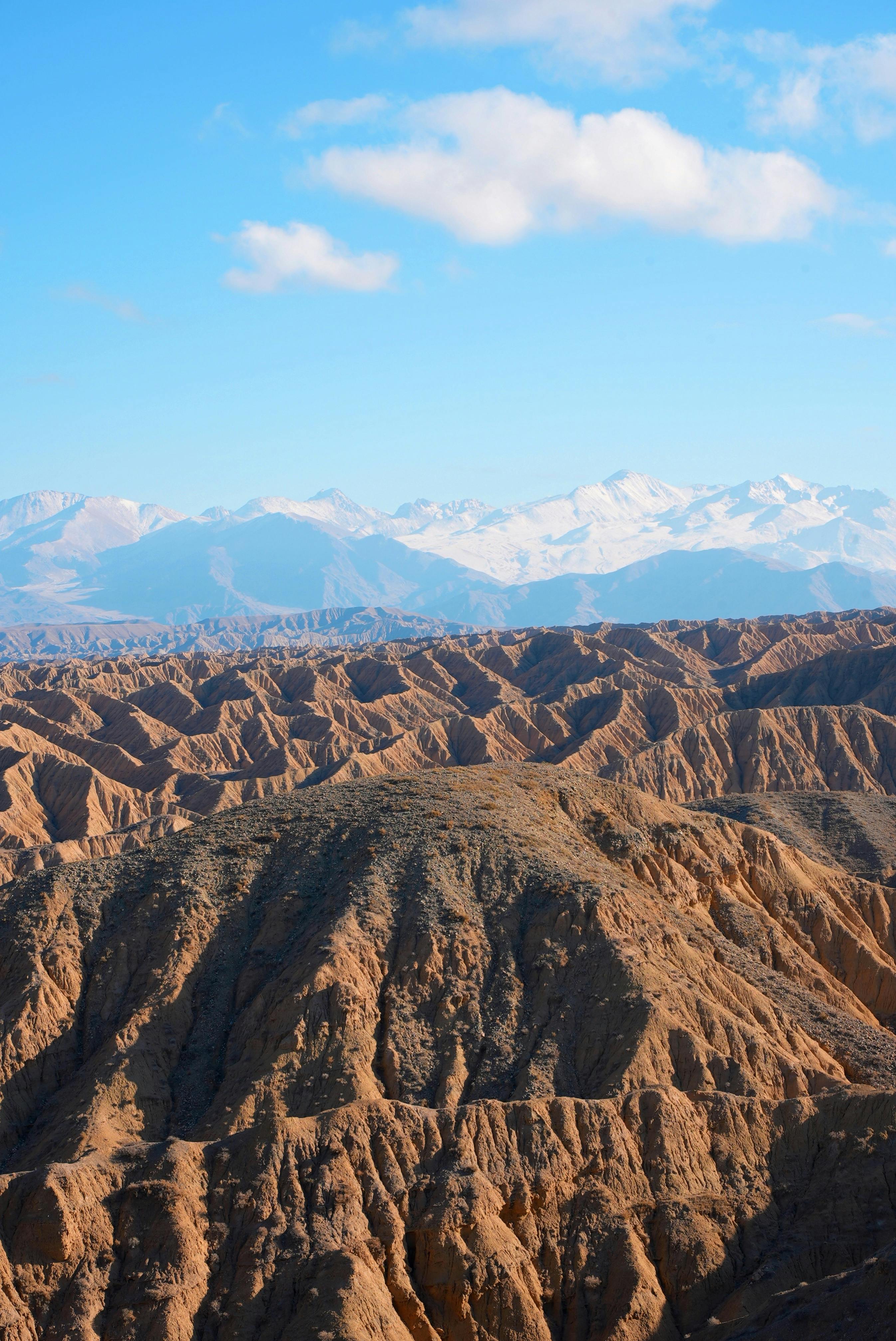 Aerial View of Dramatic Desert Badlands · Free Stock Photo