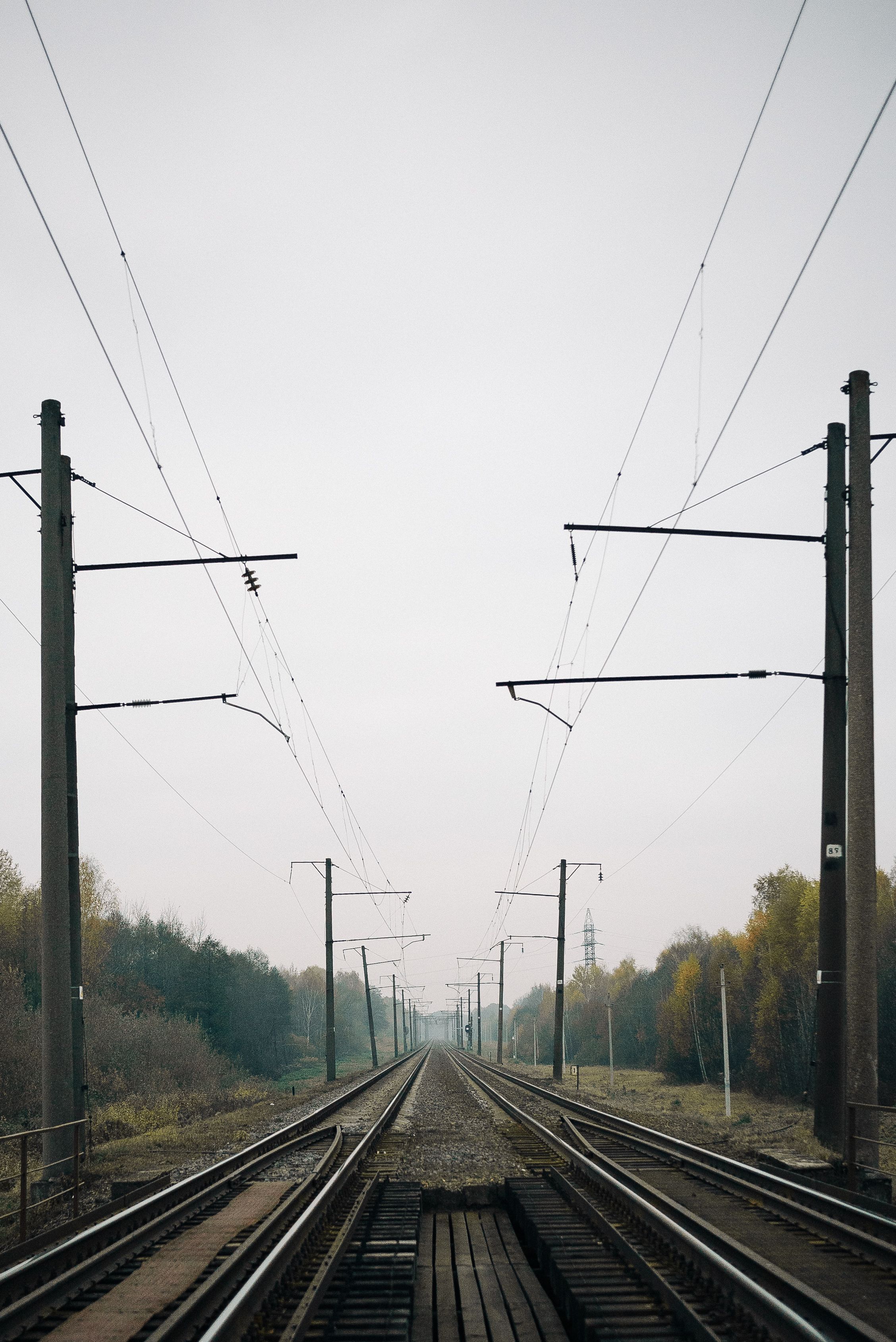 Scenic Railway Tracks in Minsk's Countryside · Free Stock Photo