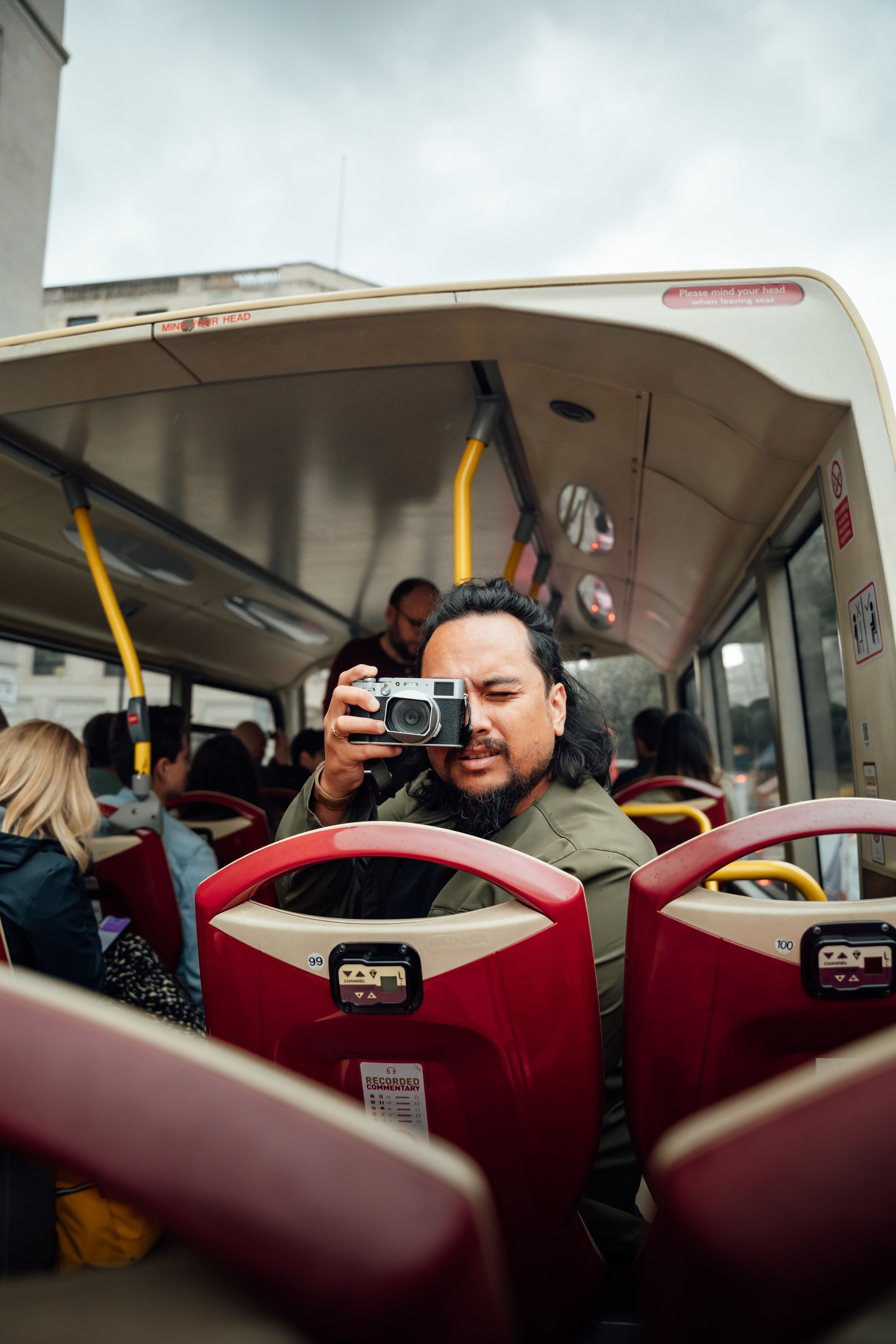 Candid Bus Moment in London with Photographer · Free Stock Photo
