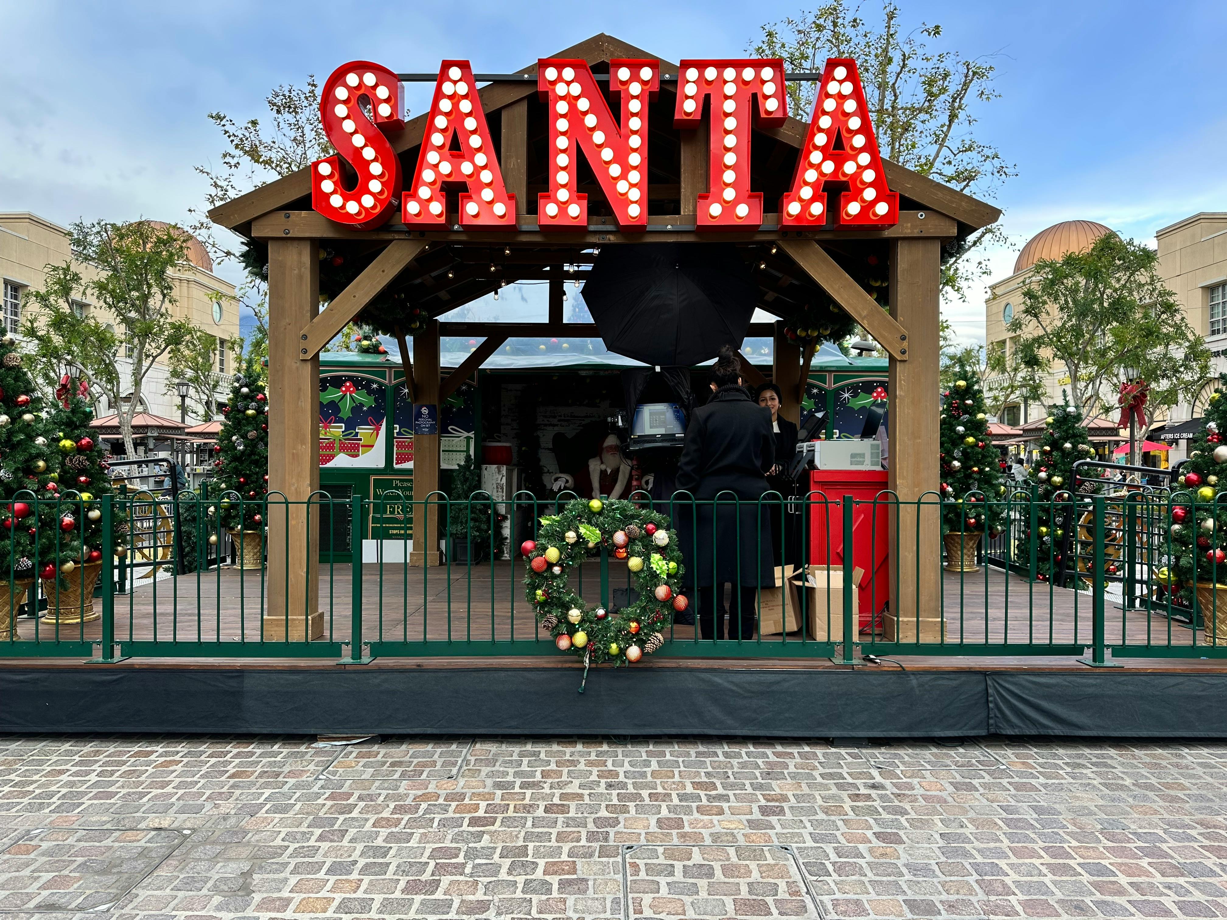Festive Santa Booth with Christmas Decorations · Free Stock Photo