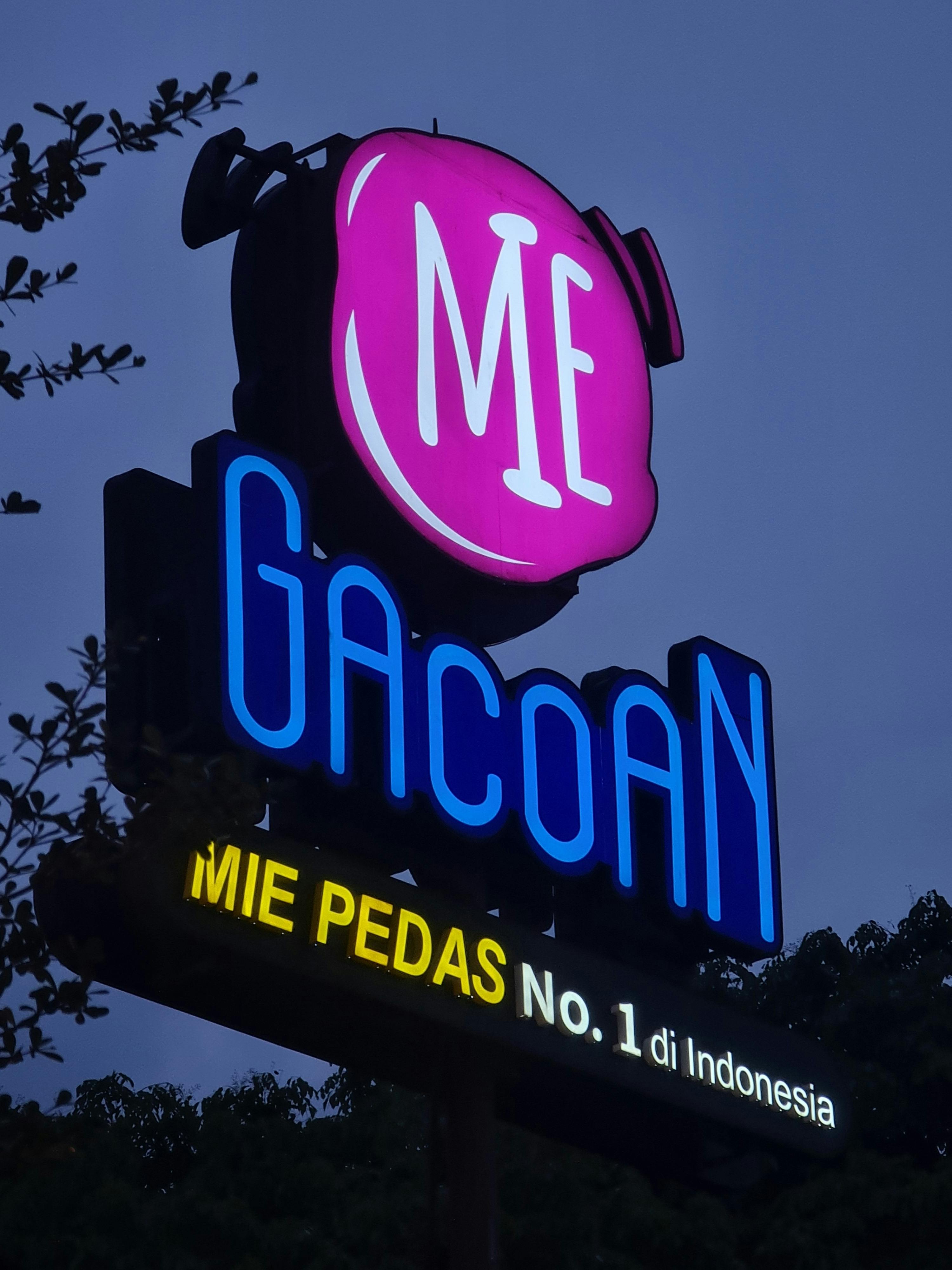 Red Eat Neon Sign Turned on · Free Stock Photo