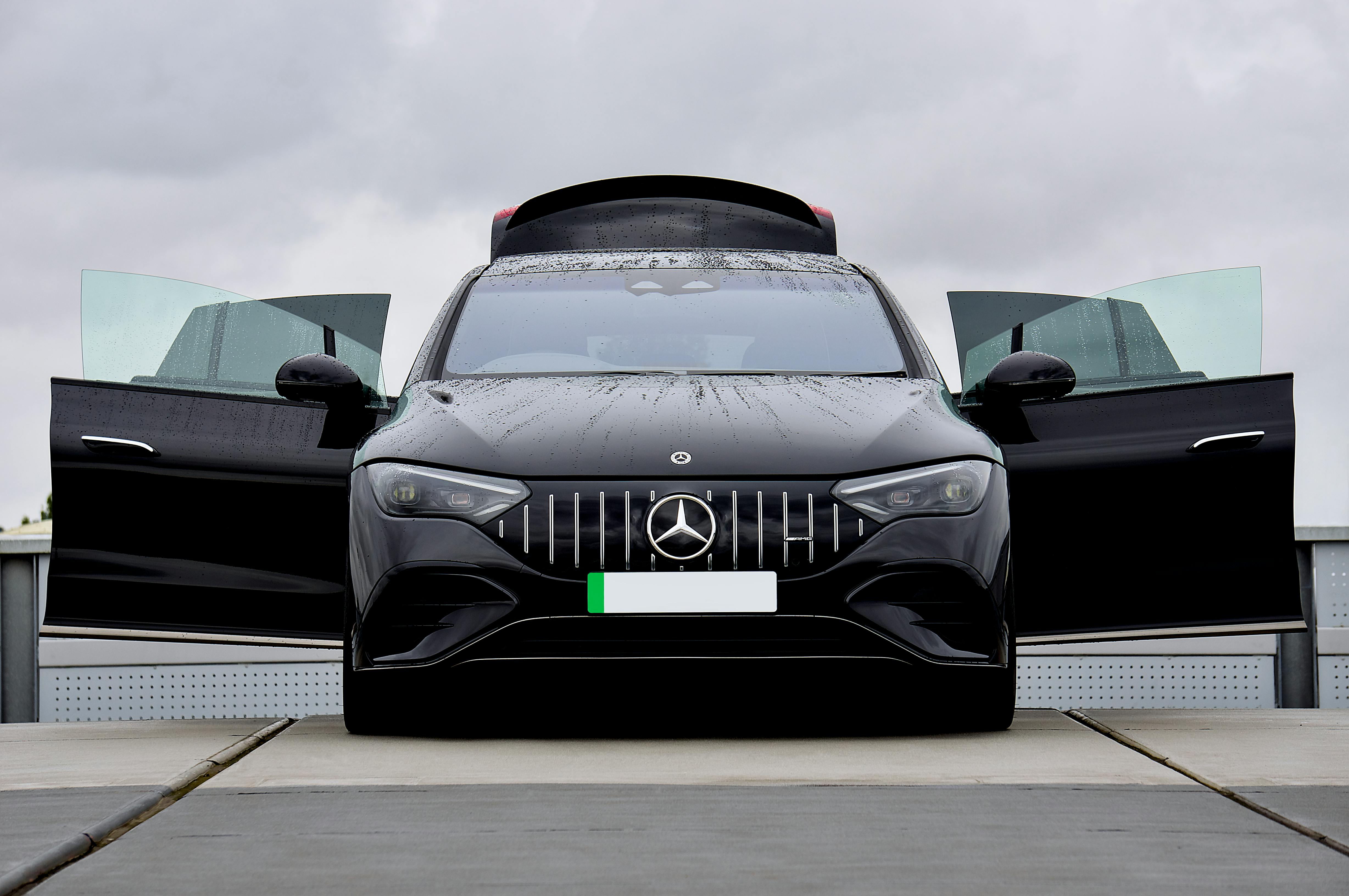 Sleek Mercedes-Benz Car Front View with Open Doors · Free Stock Photo