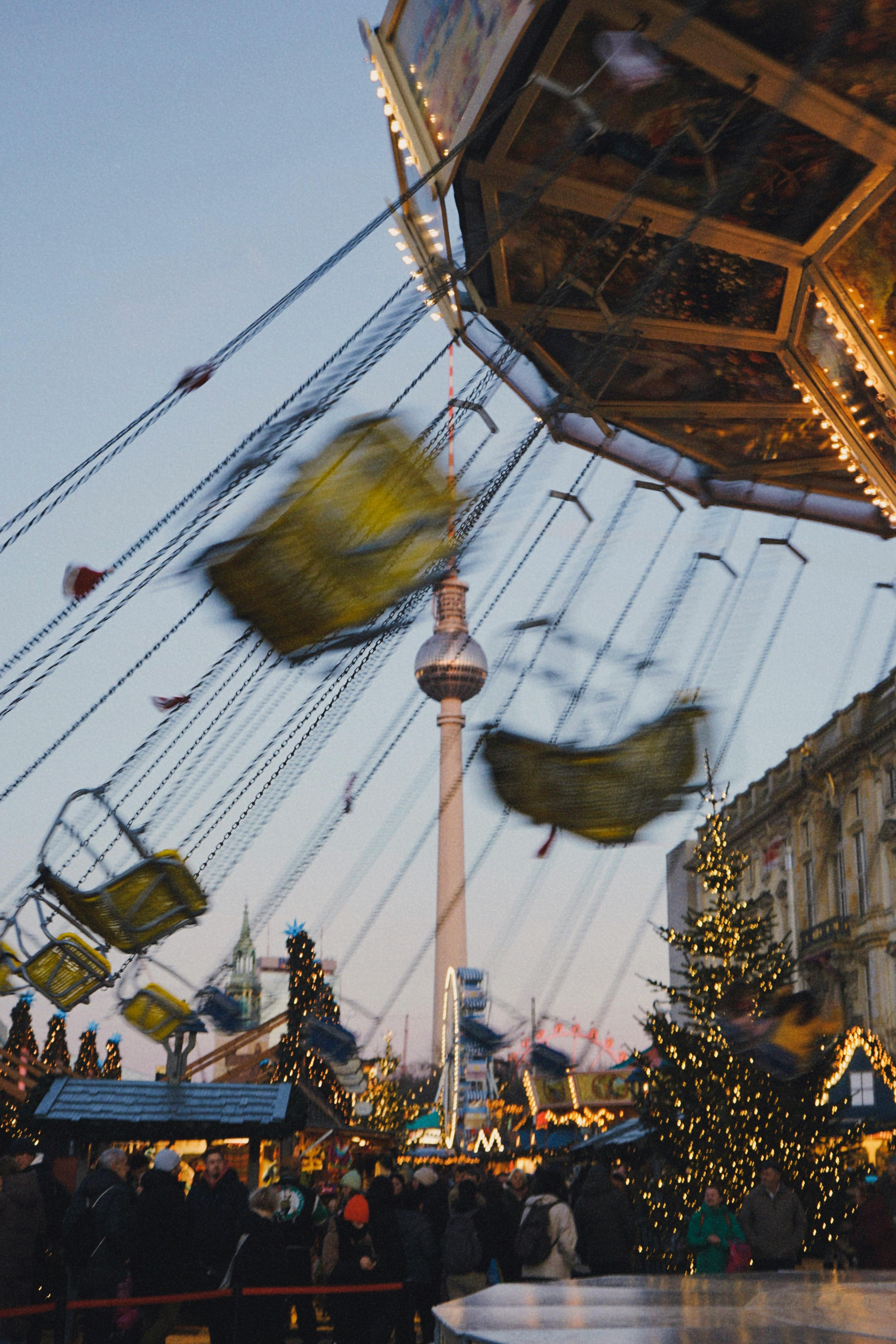 Berlin Christmas Market with Spinning Merry-Go-Round · Free Stock Photo