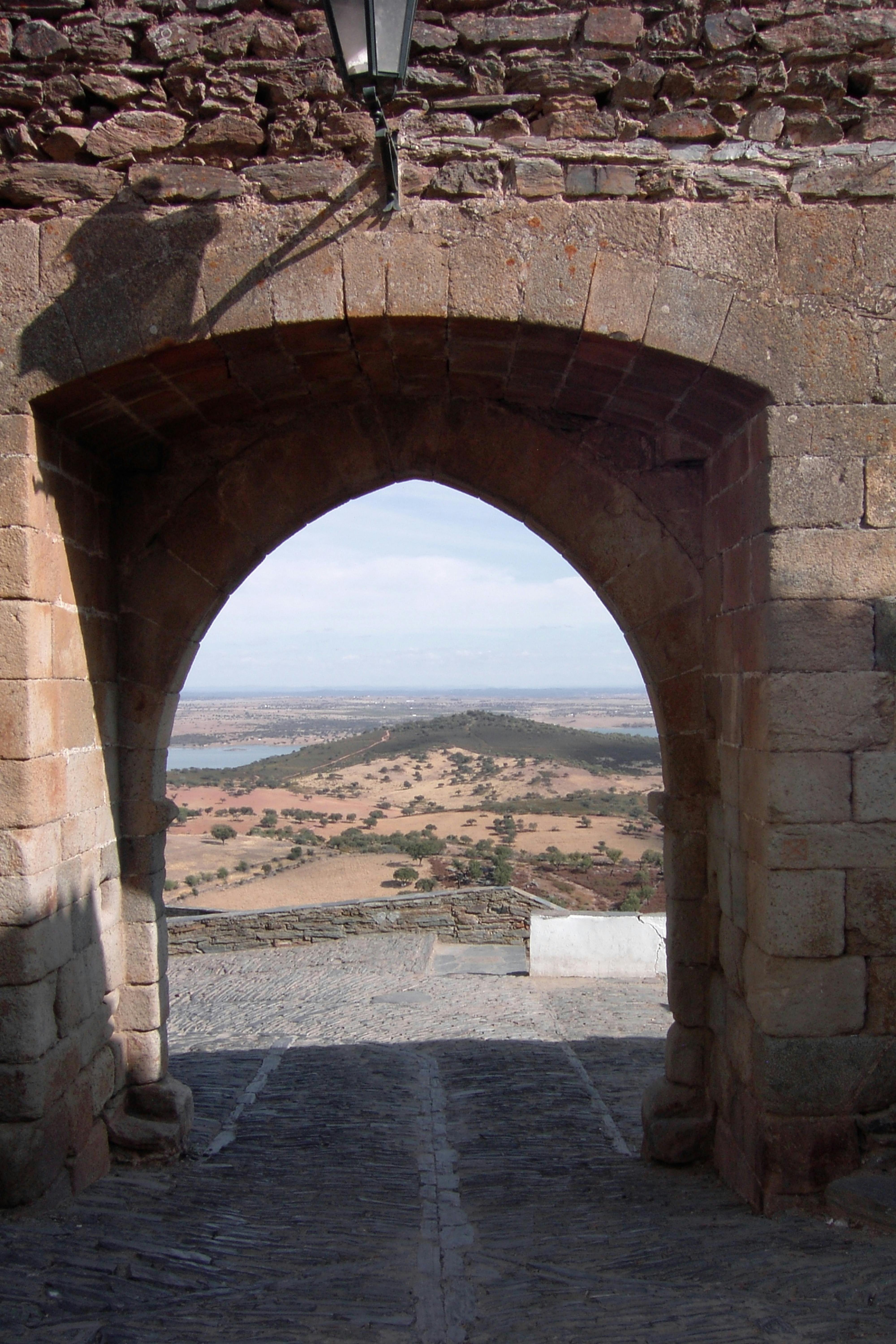Rustic Portuguese Castle Archway with View · Free Stock Photo