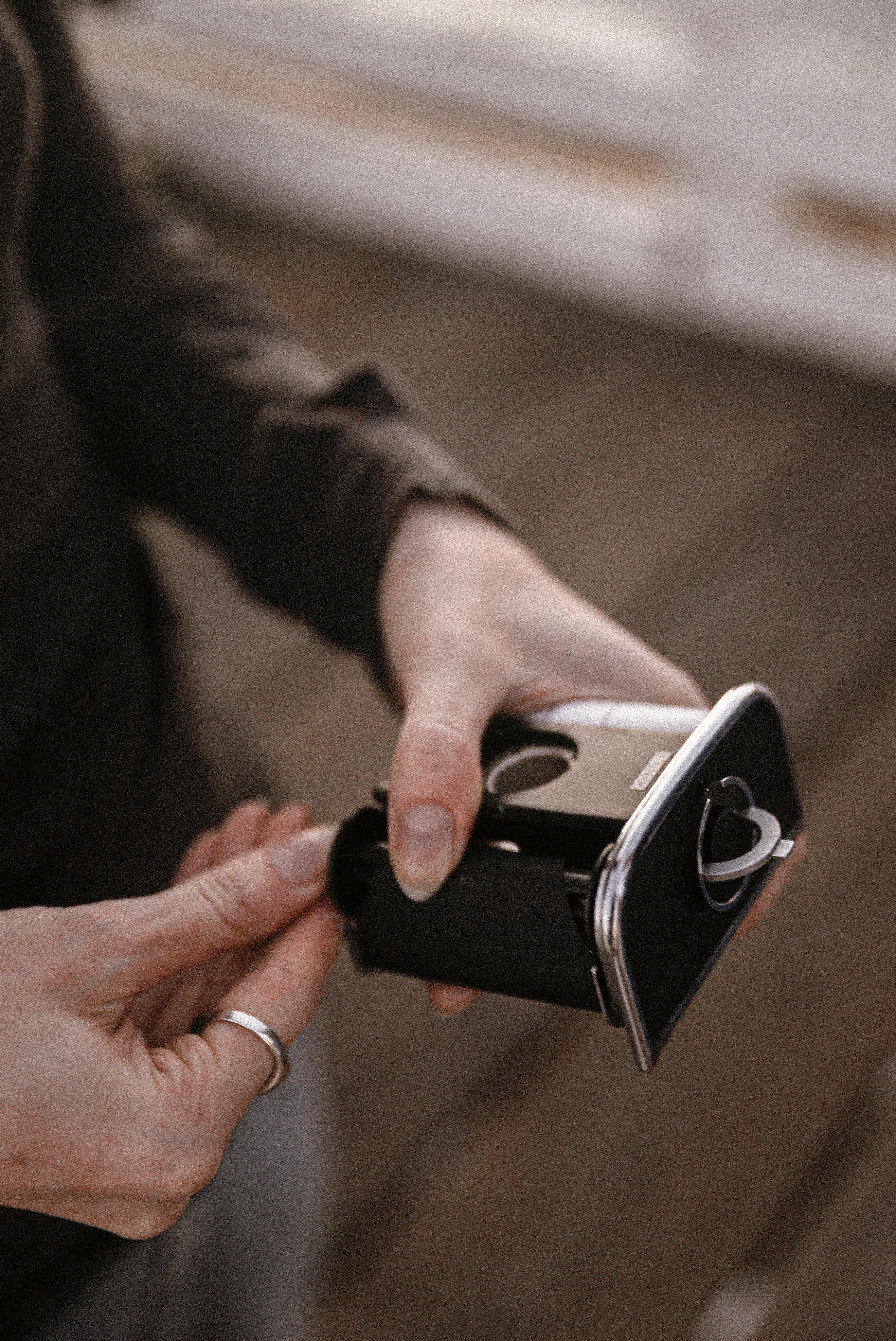 Woman Holding Device · Free Stock Photo