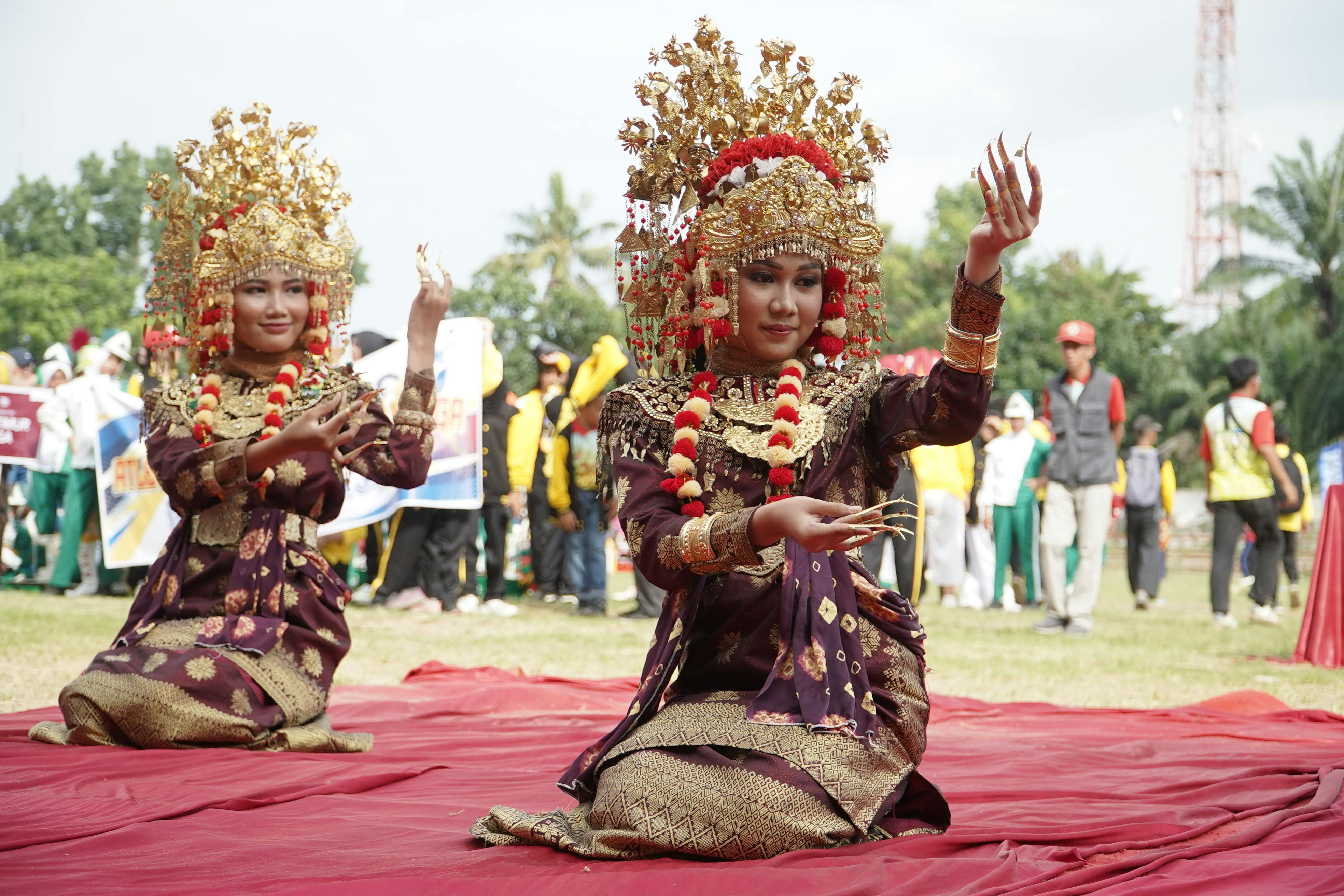 Traditional Dance Performance with Elaborate Costumes · Free Stock Photo