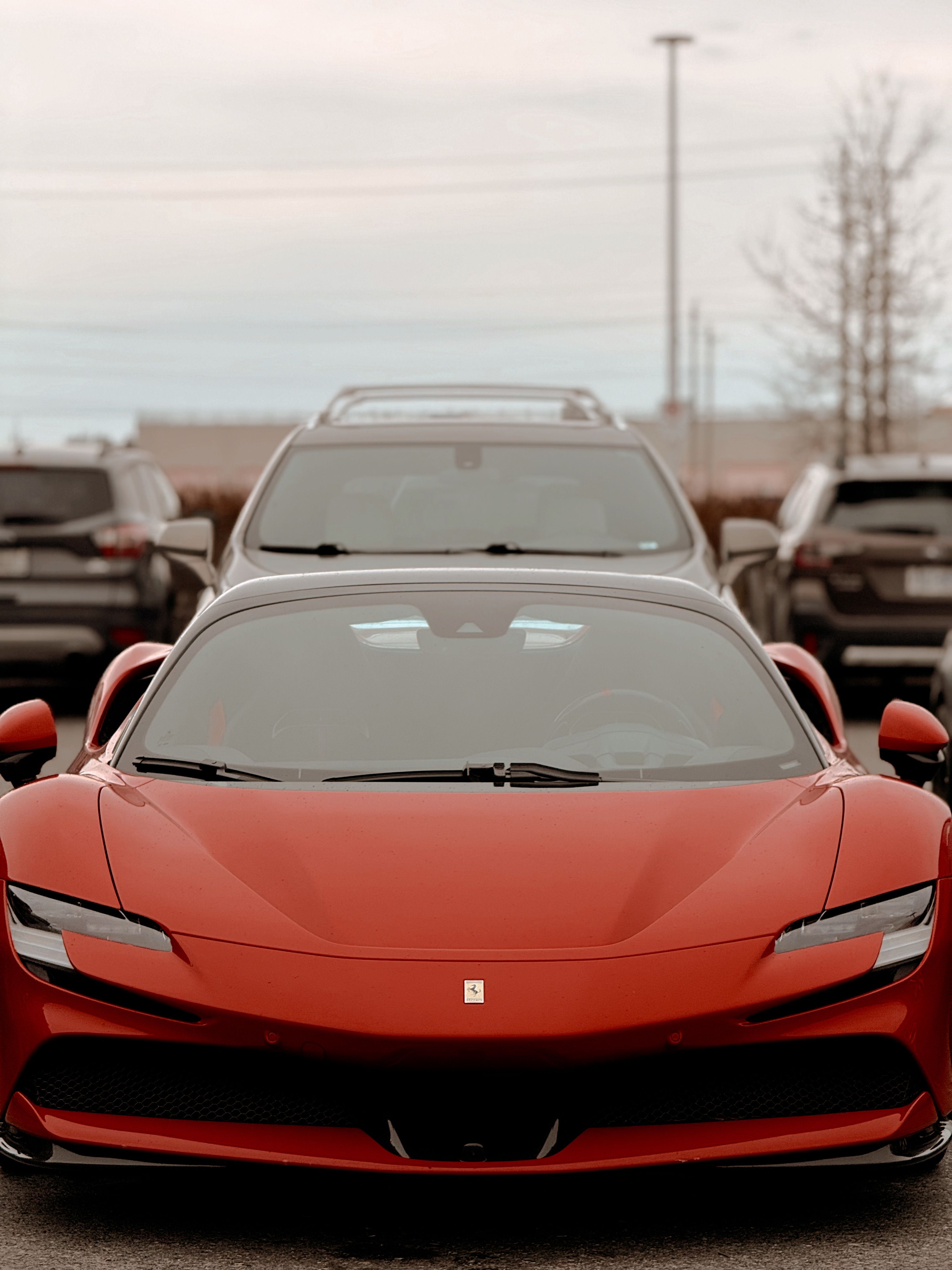 Red Ferrari Car Parked outside a Building · Free Stock Photo