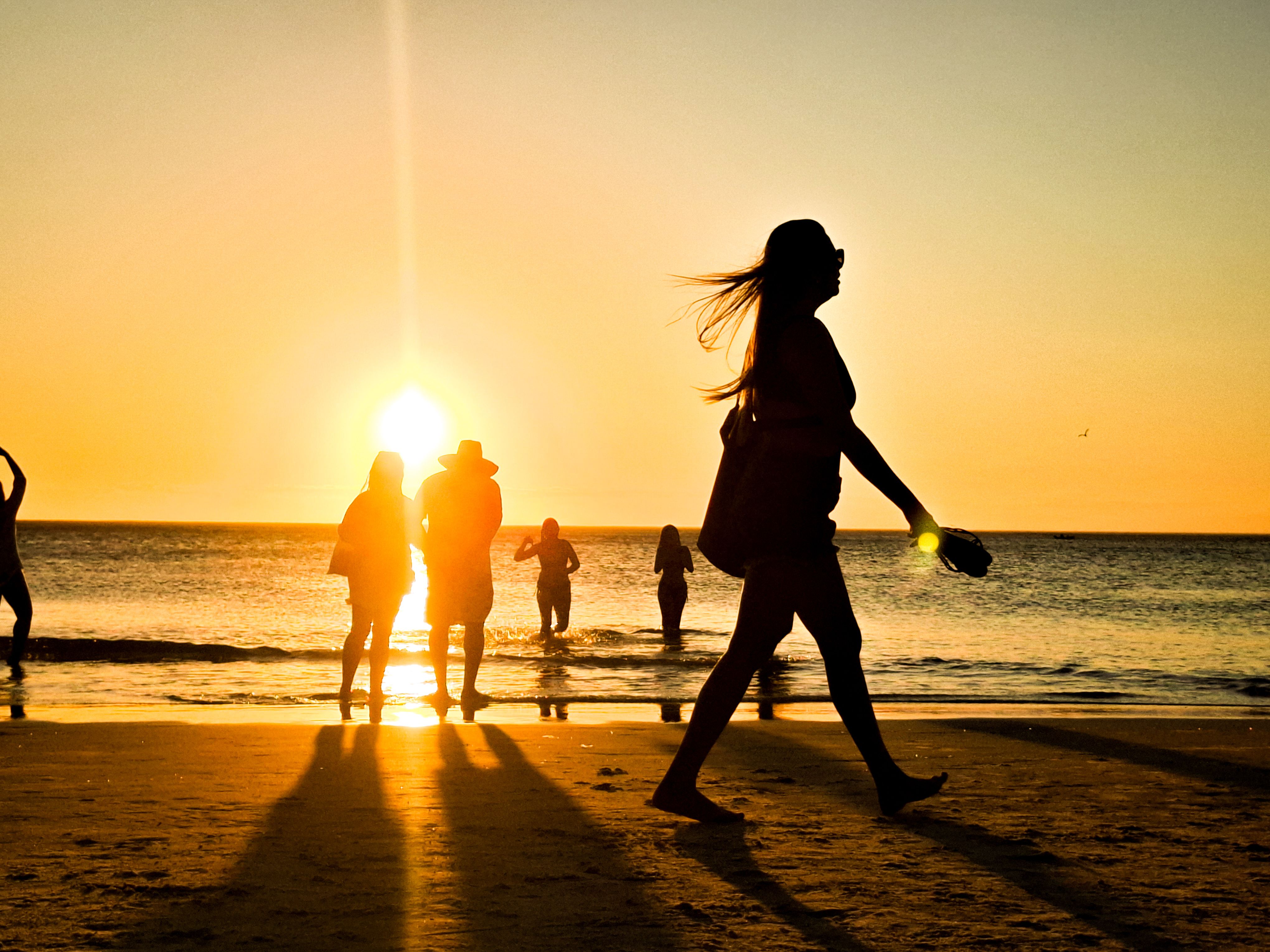 Silhouettes on Arraial do Cabo Beach at Sunset · Free Stock Photo