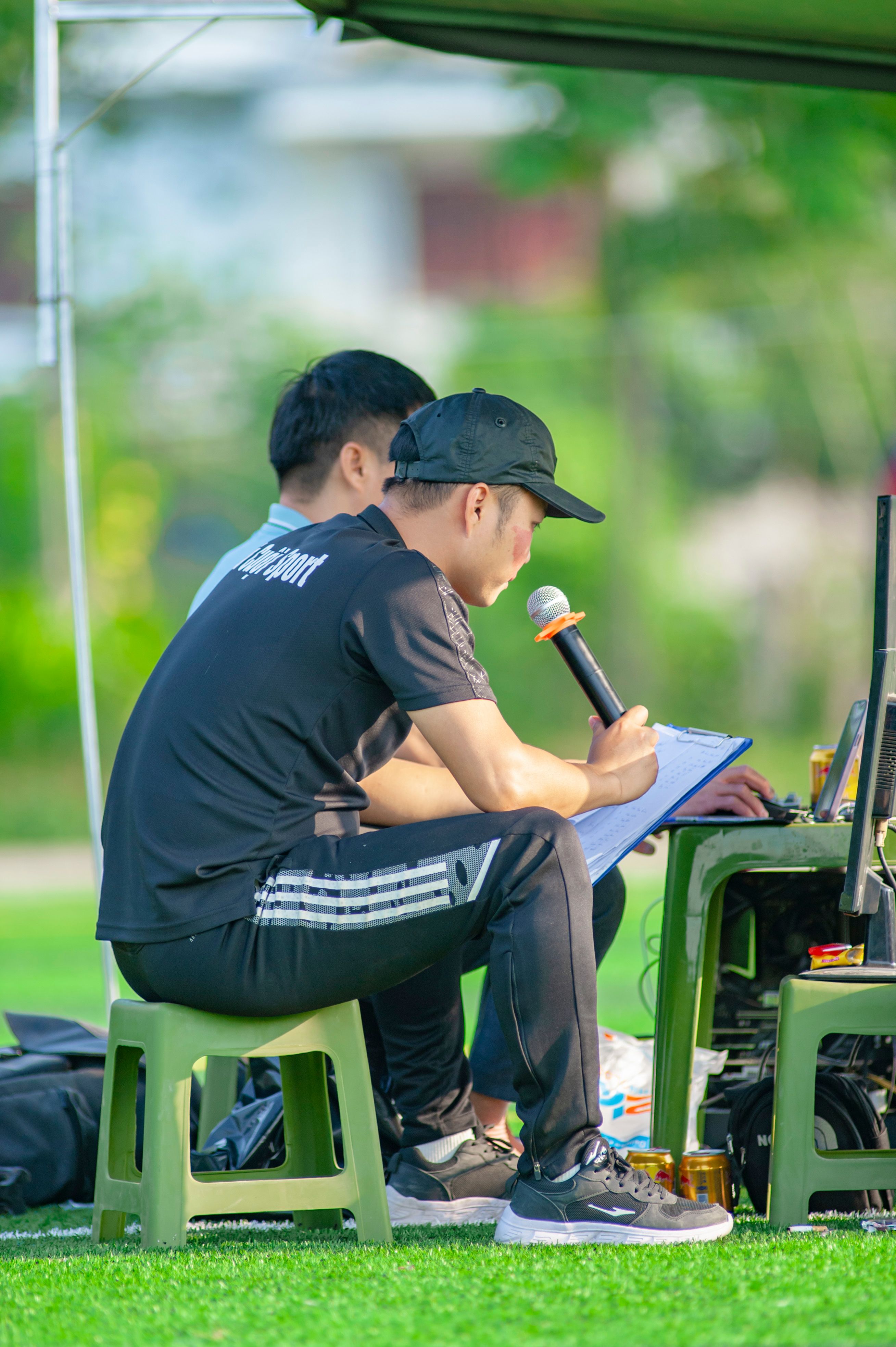 Young Men Announce Outdoor Sports Event in Hanoi · Free Stock Photo