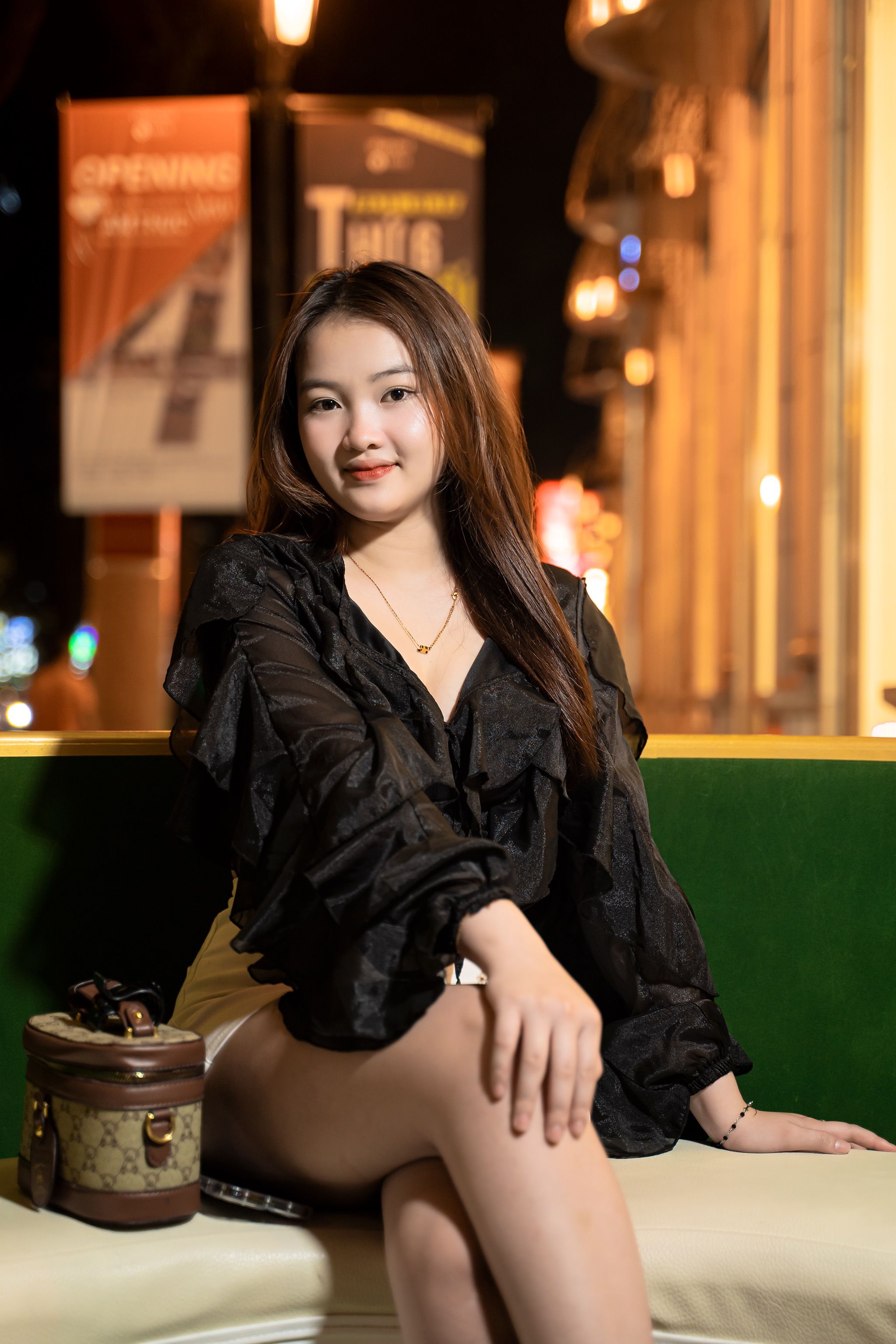 Stylish woman relaxing at night outdoors · Free Stock Photo