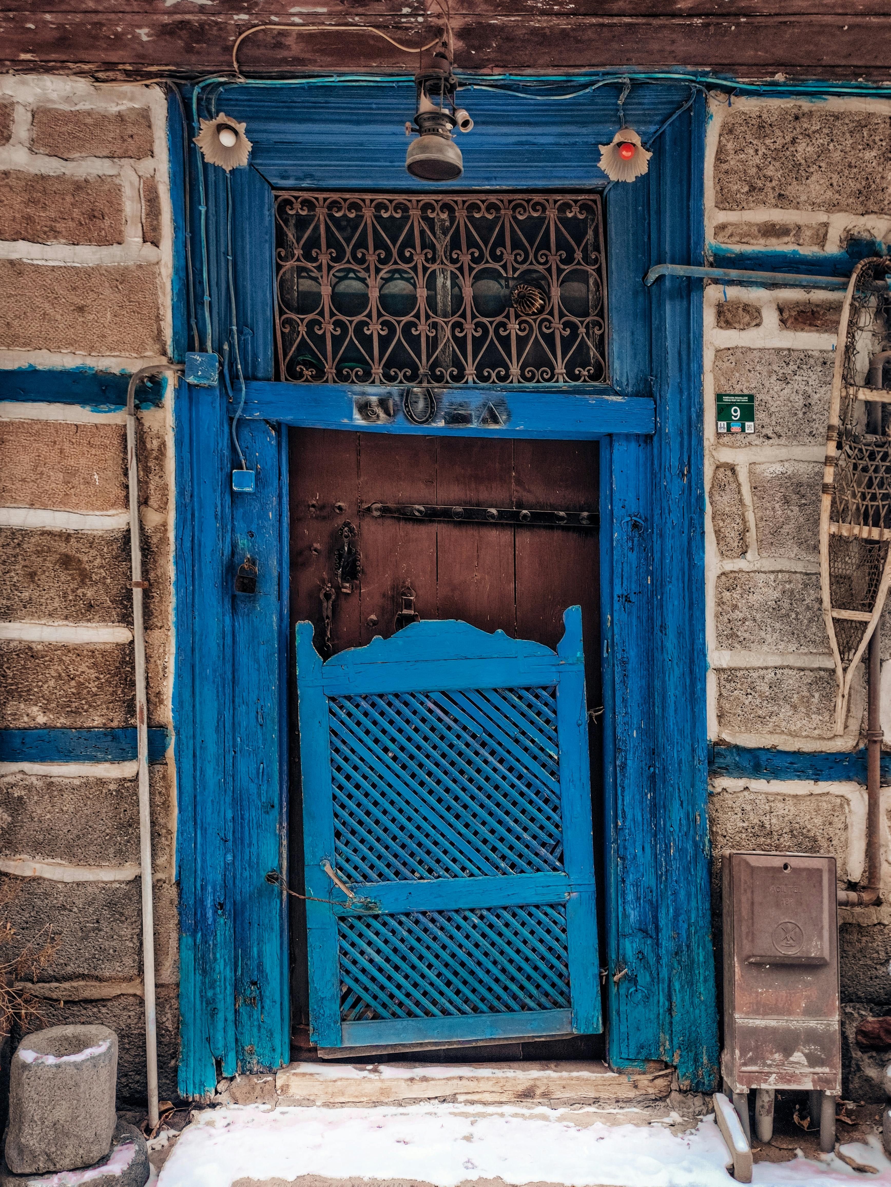 Rustic Blue Door on Stone Building Exterior · Free Stock Photo