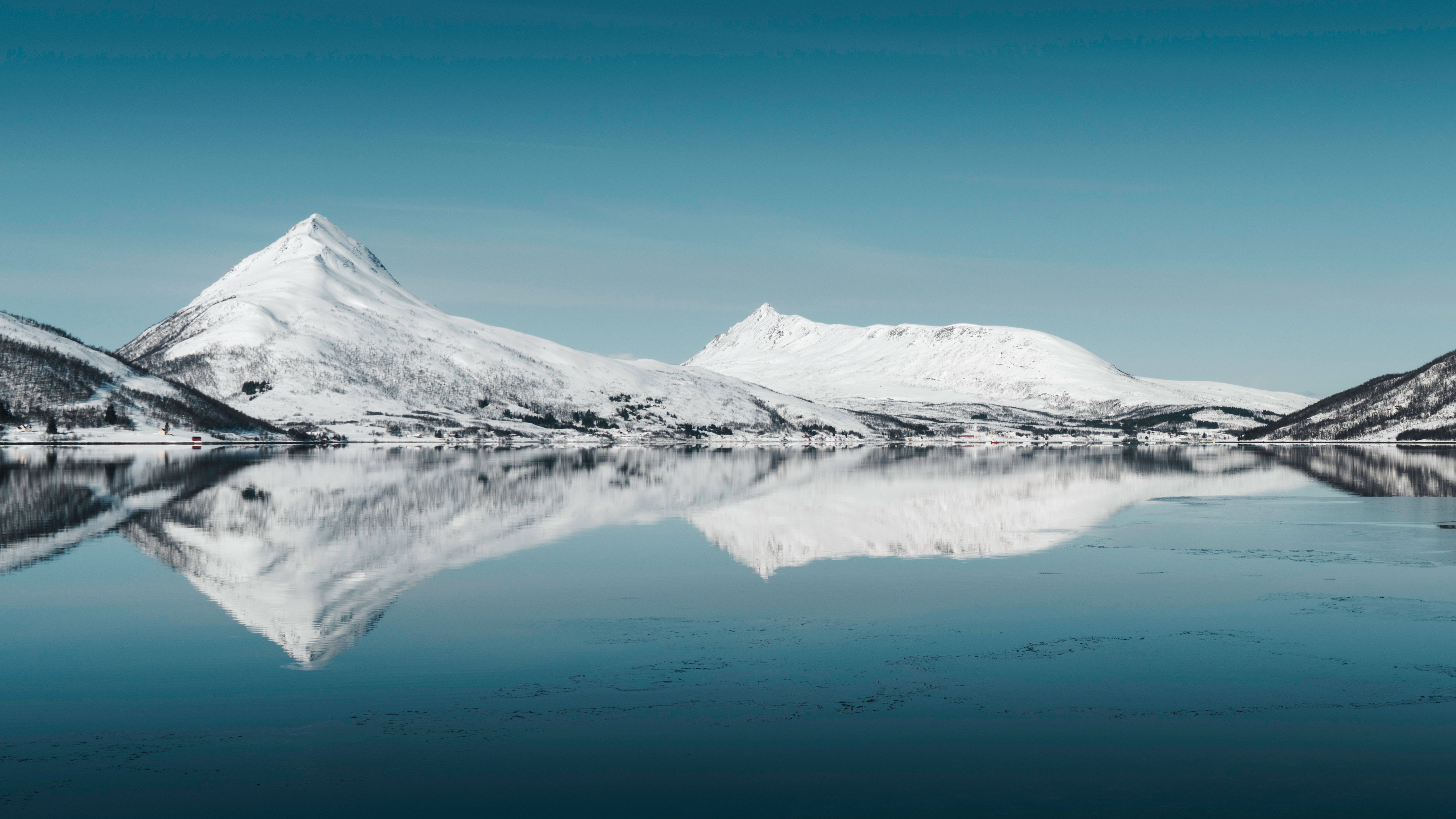 Captivating Arctic Landscape with Snowy Peaks · Free Stock Photo