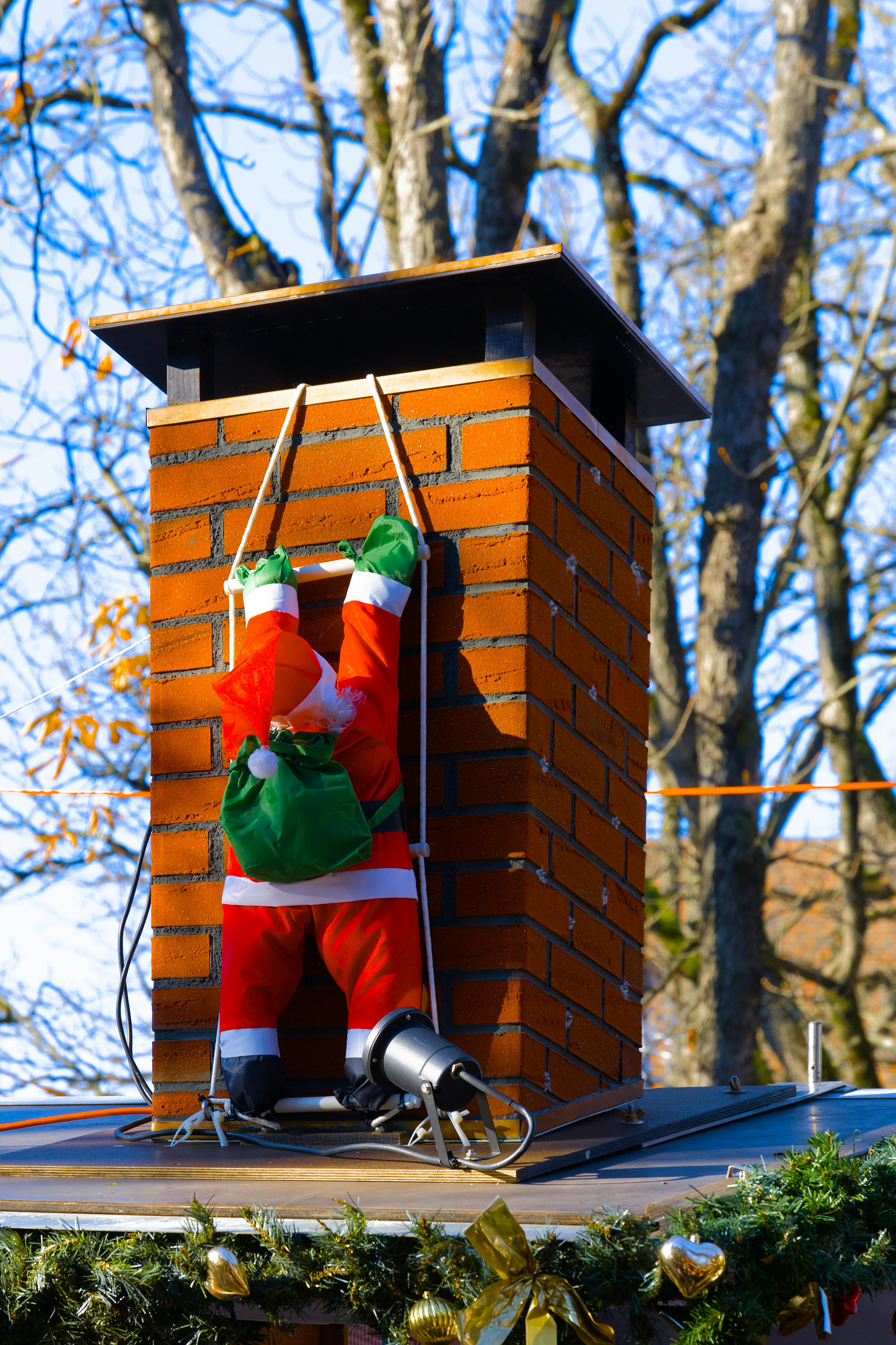 Santa Climbing Through Chimney Photos, Download The BEST Free Santa ...