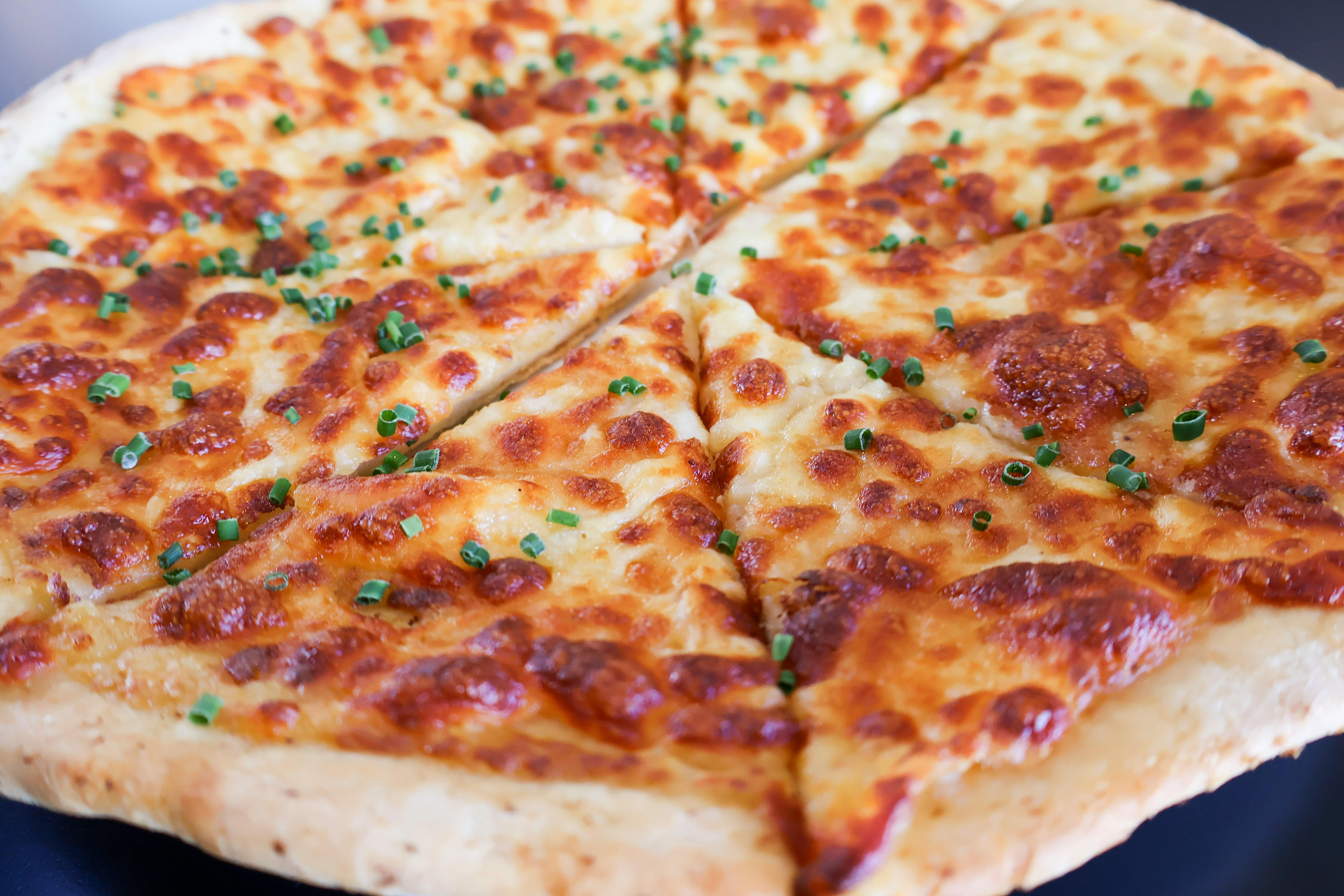 Delicious Cheese Pizza with Chives Topping · Free Stock Photo
