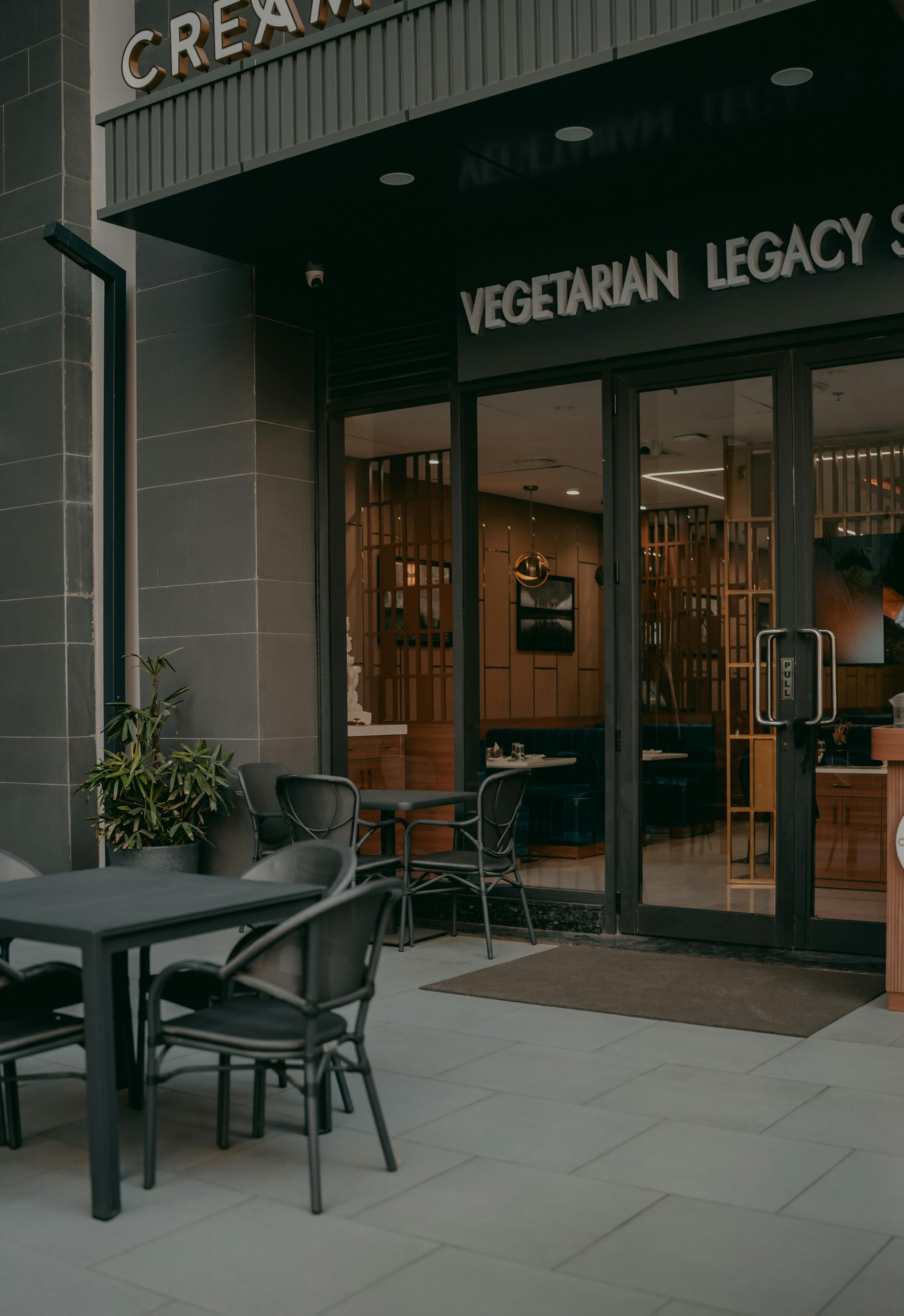 Outdoor Seating at Vegetarian Legacy Storefront · Free Stock Photo