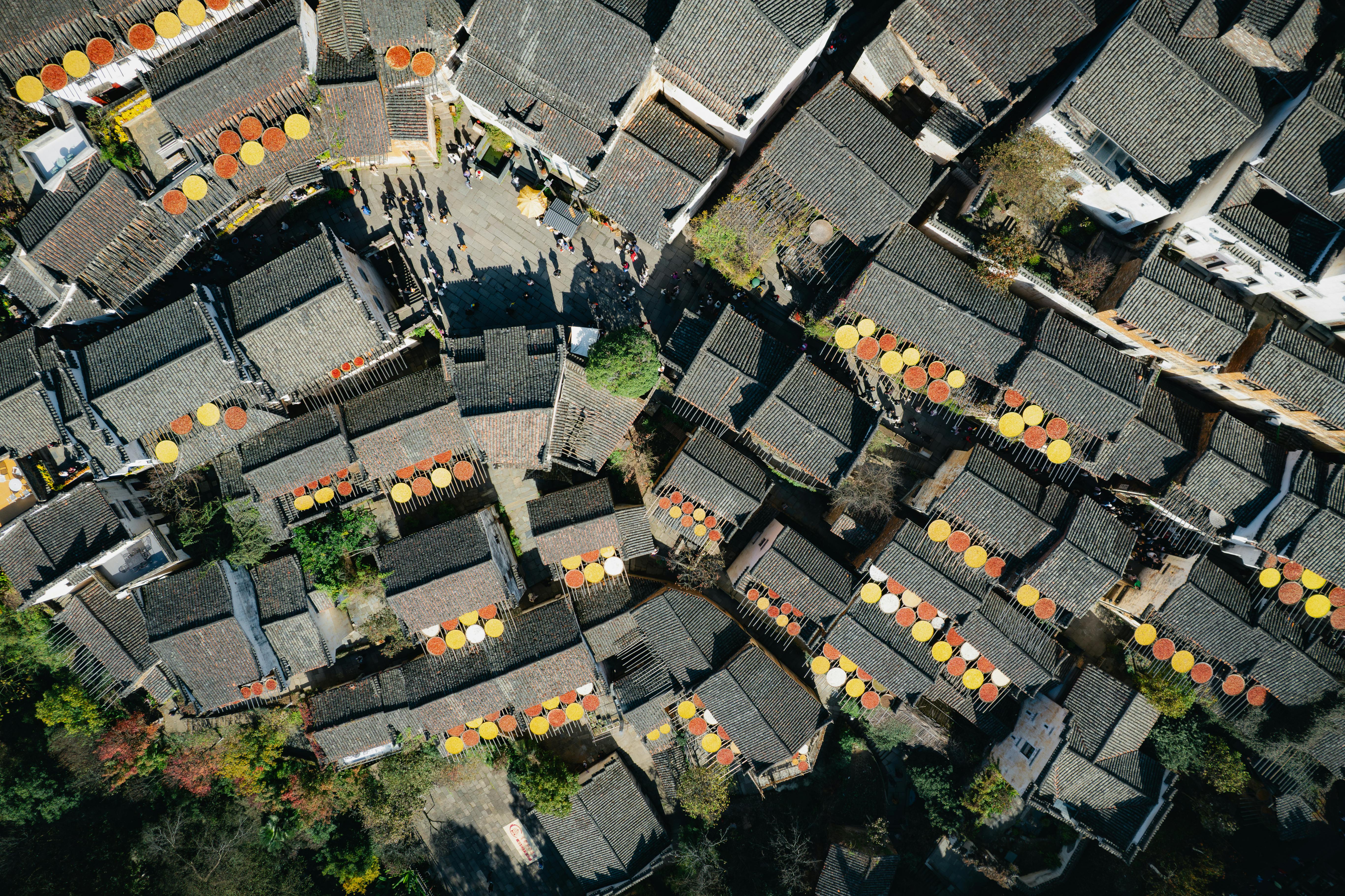 Aerial View of Traditional Chinese Village Rooftops · Free Stock Photo