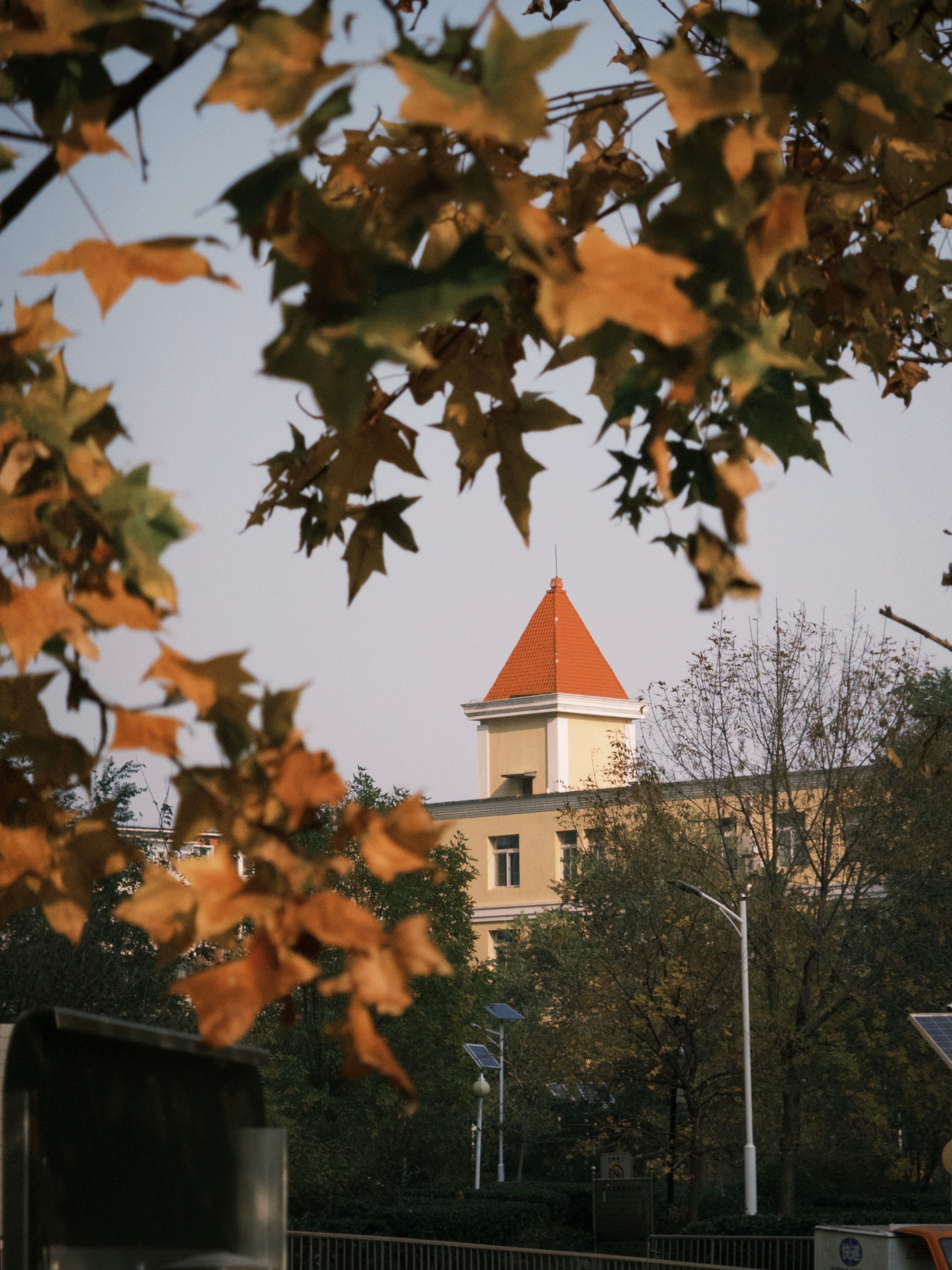 Charming Autumn Scene with Historic Building · Free Stock Photo