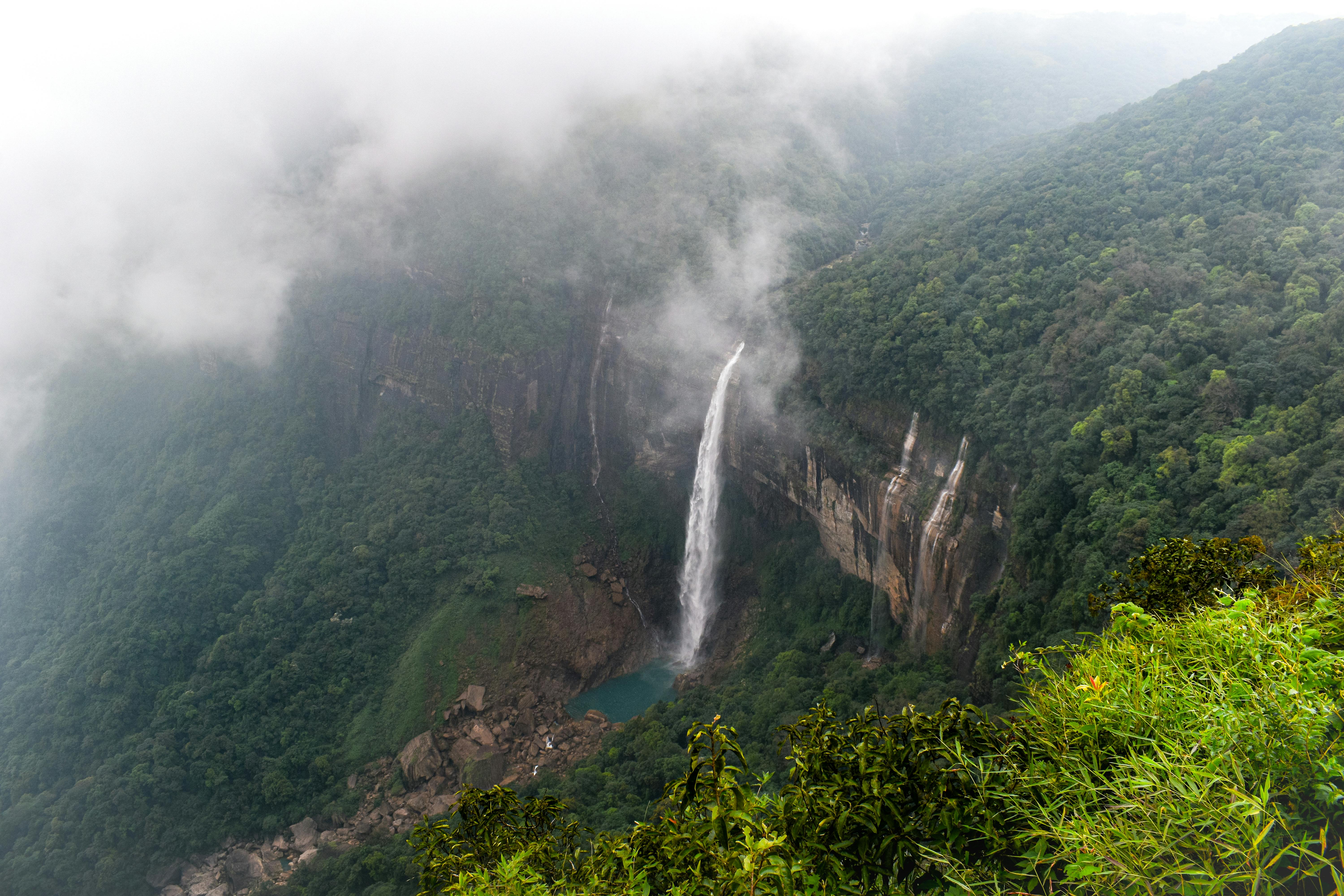 Majestic Waterfall Amidst Lush Greenery in Meghalaya · Free Stock Photo