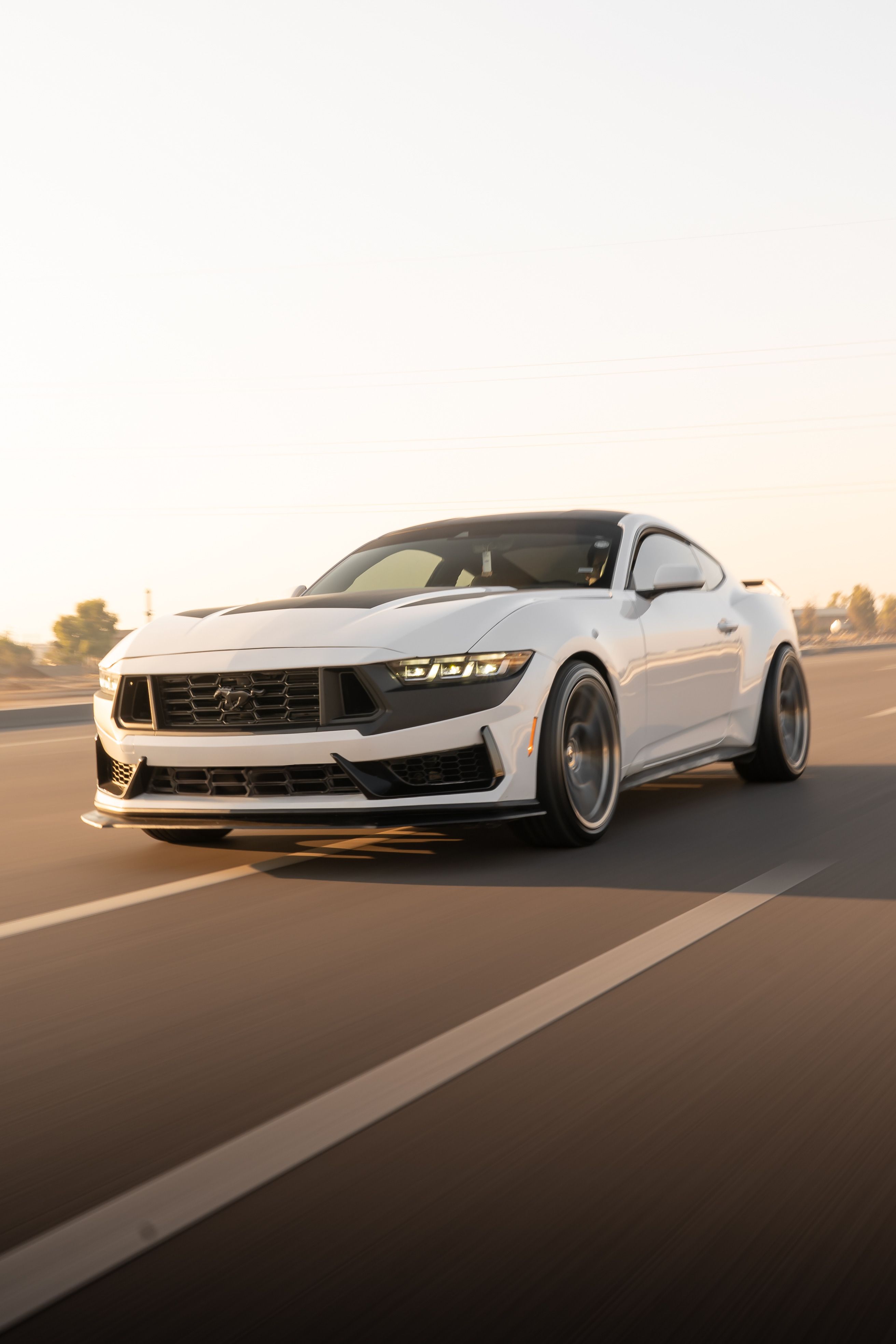Sleek White Mustang GT Cruising at Sunset · Free Stock Photo