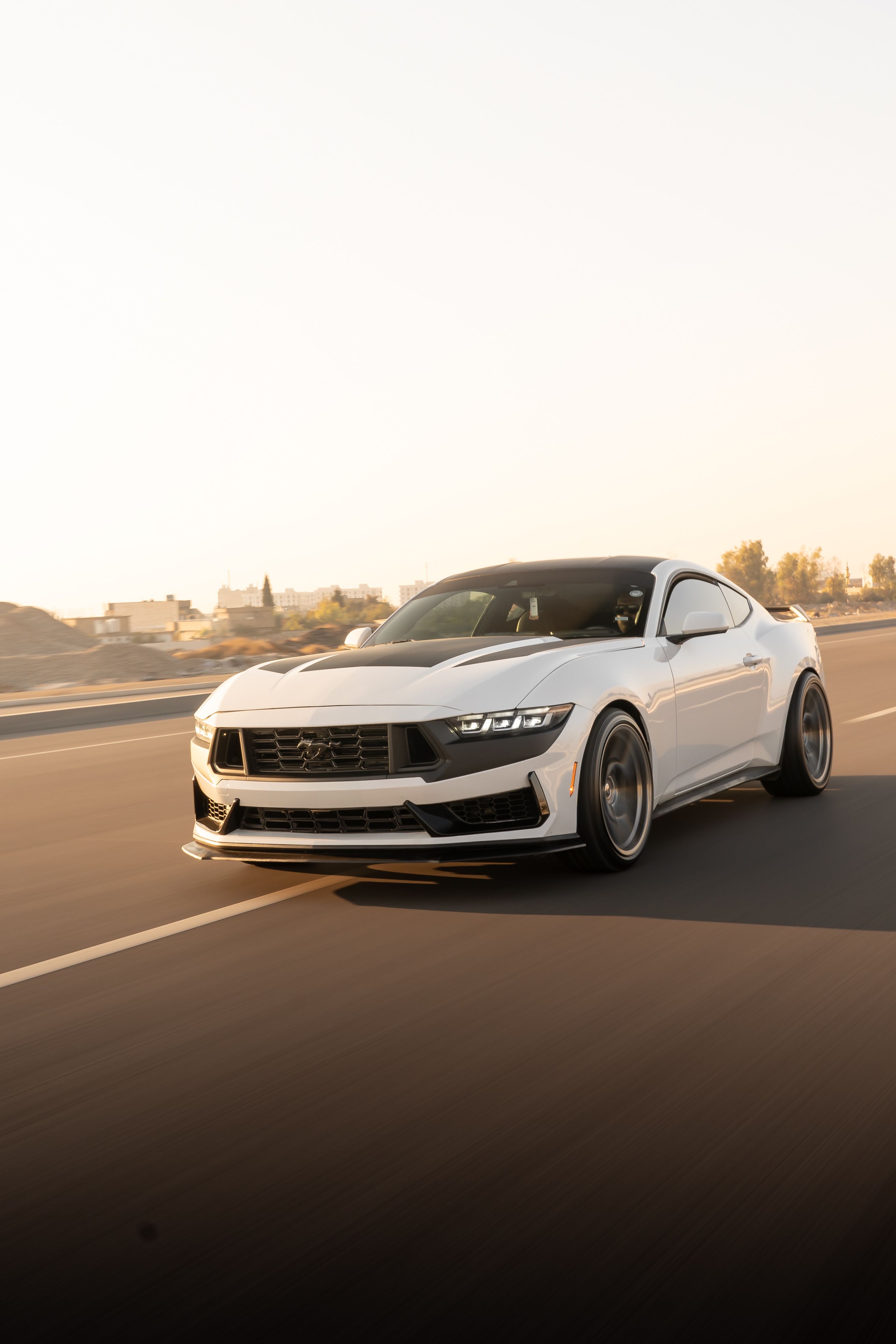 Sleek White Mustang GT Cruising at Sunset · Free Stock Photo