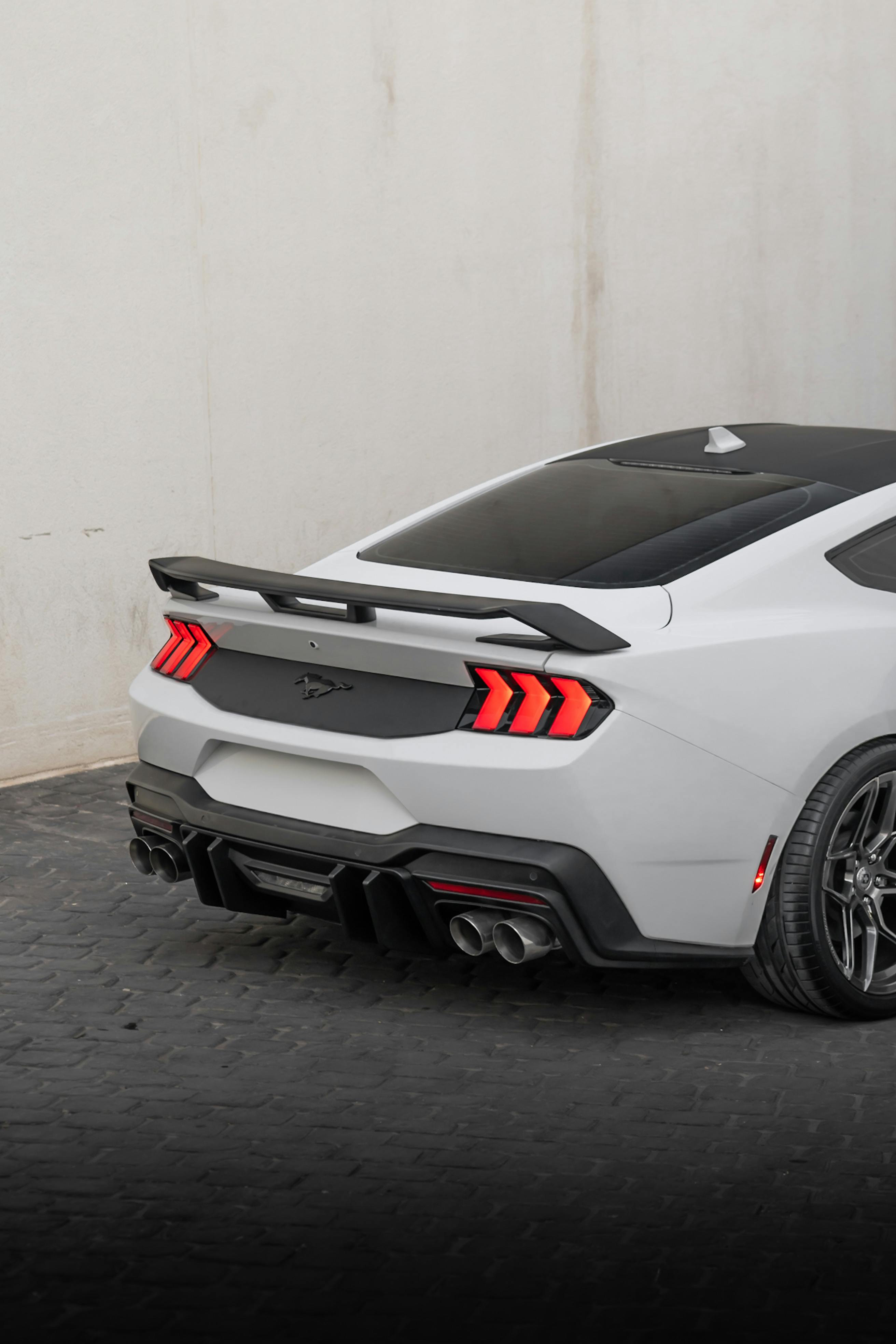 Sleek White Ford Mustang GT Rear View · Free Stock Photo