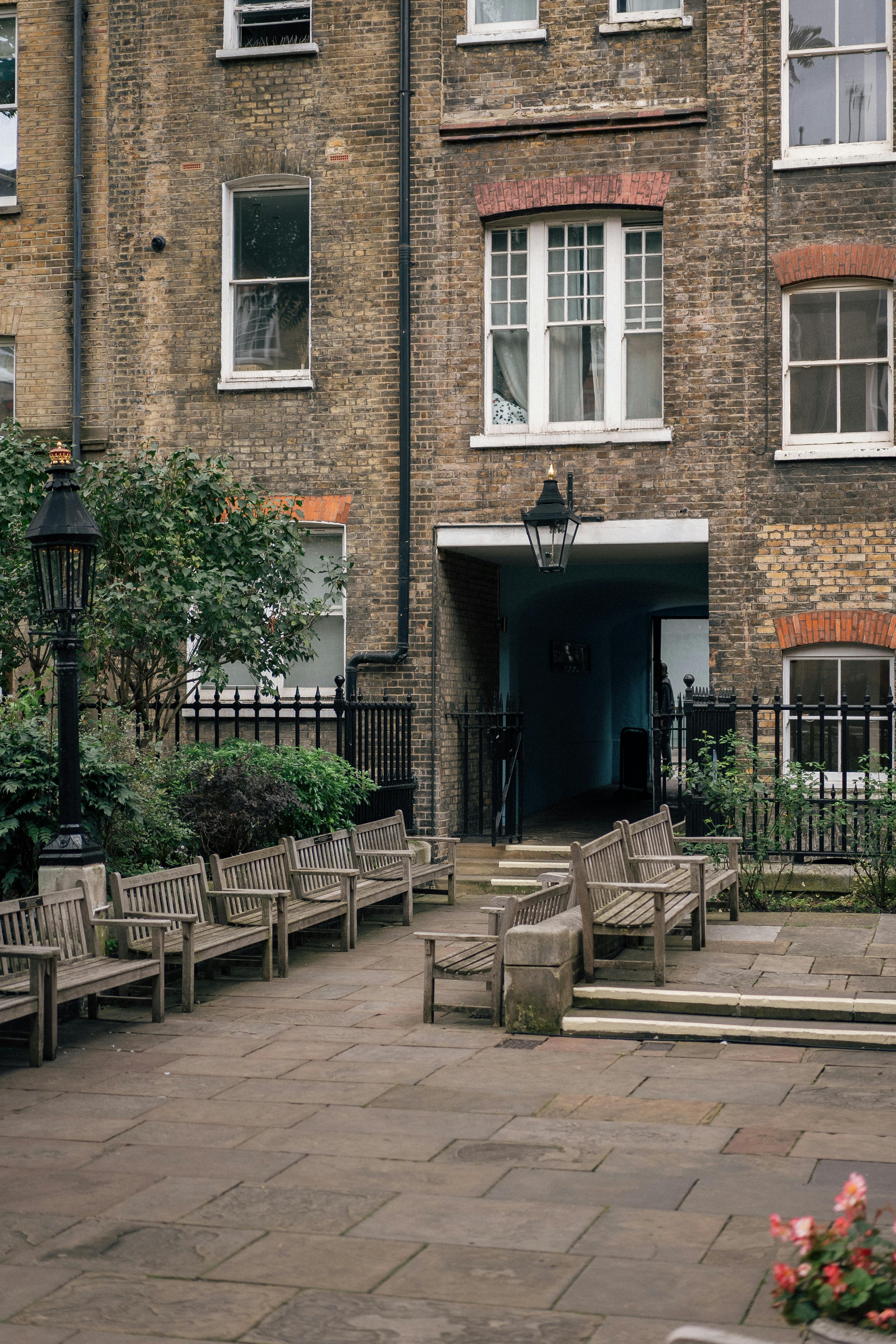 Charming Courtyard in London with Benches and Historical Architecture ...
