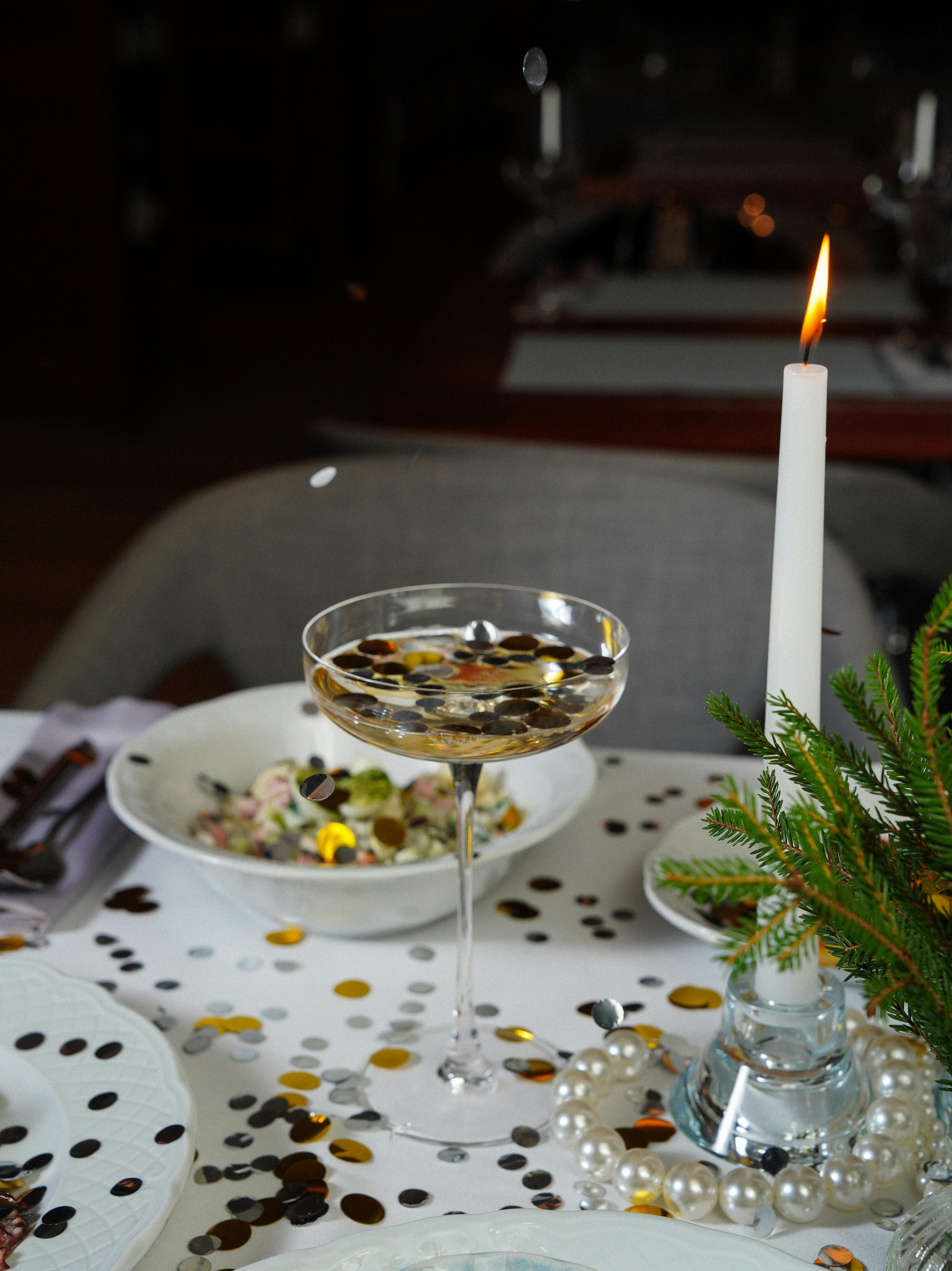 Festive Table Setting with Champagne and Candlelight · Free Stock Photo