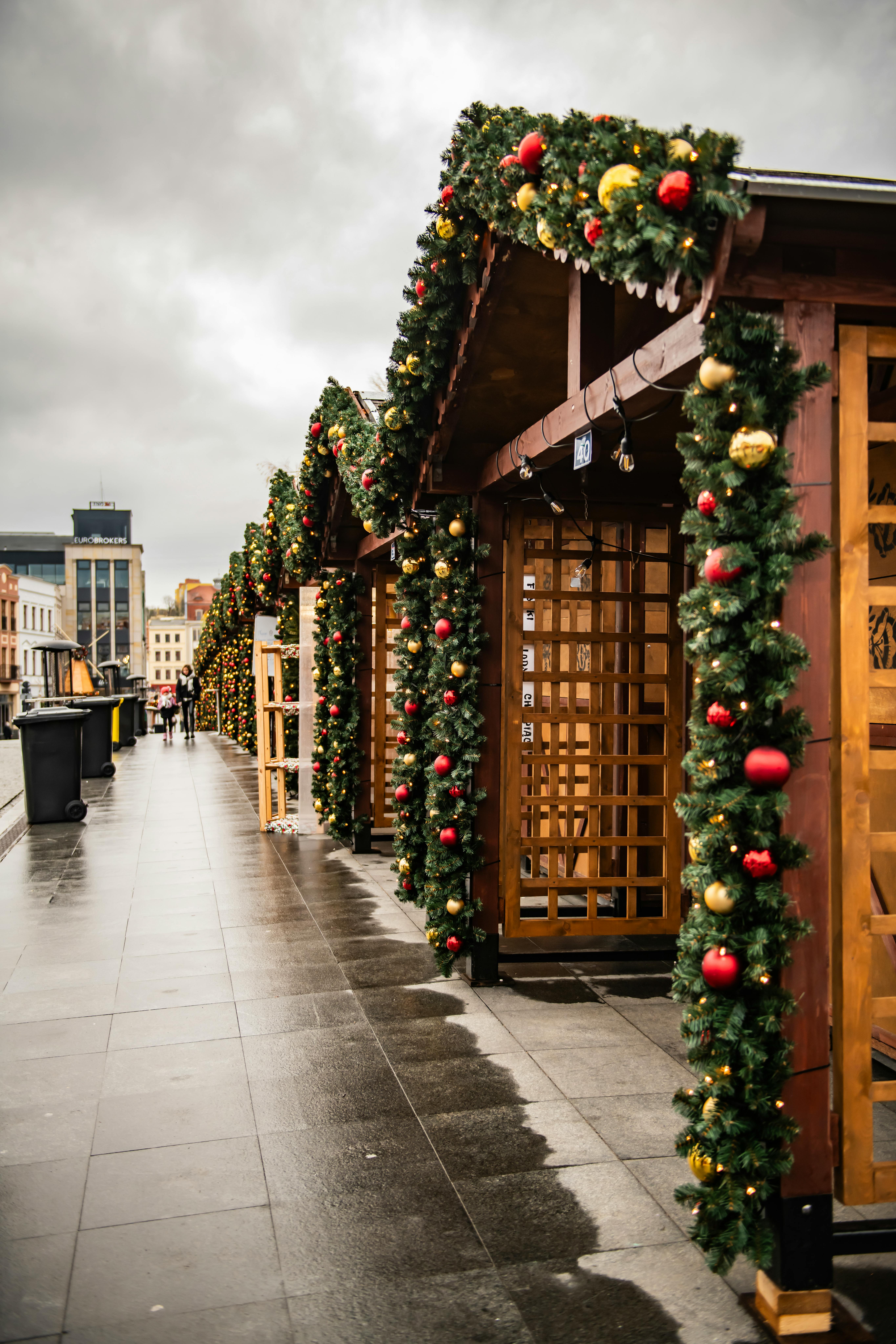 Festive Christmas Market Stalls Outdoors · Free Stock Photo