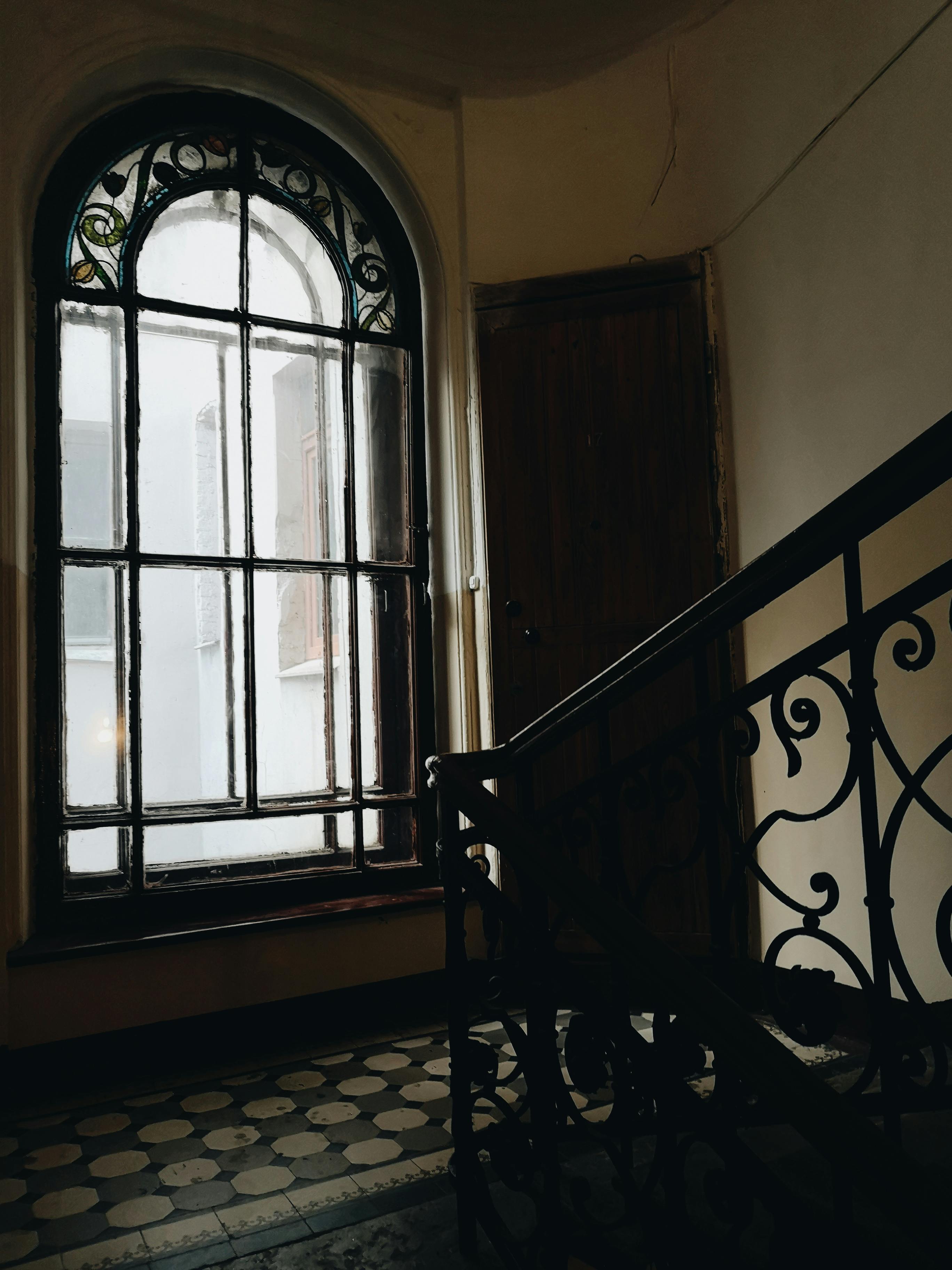 Photo Of Window Near Staircase · Free Stock Photo