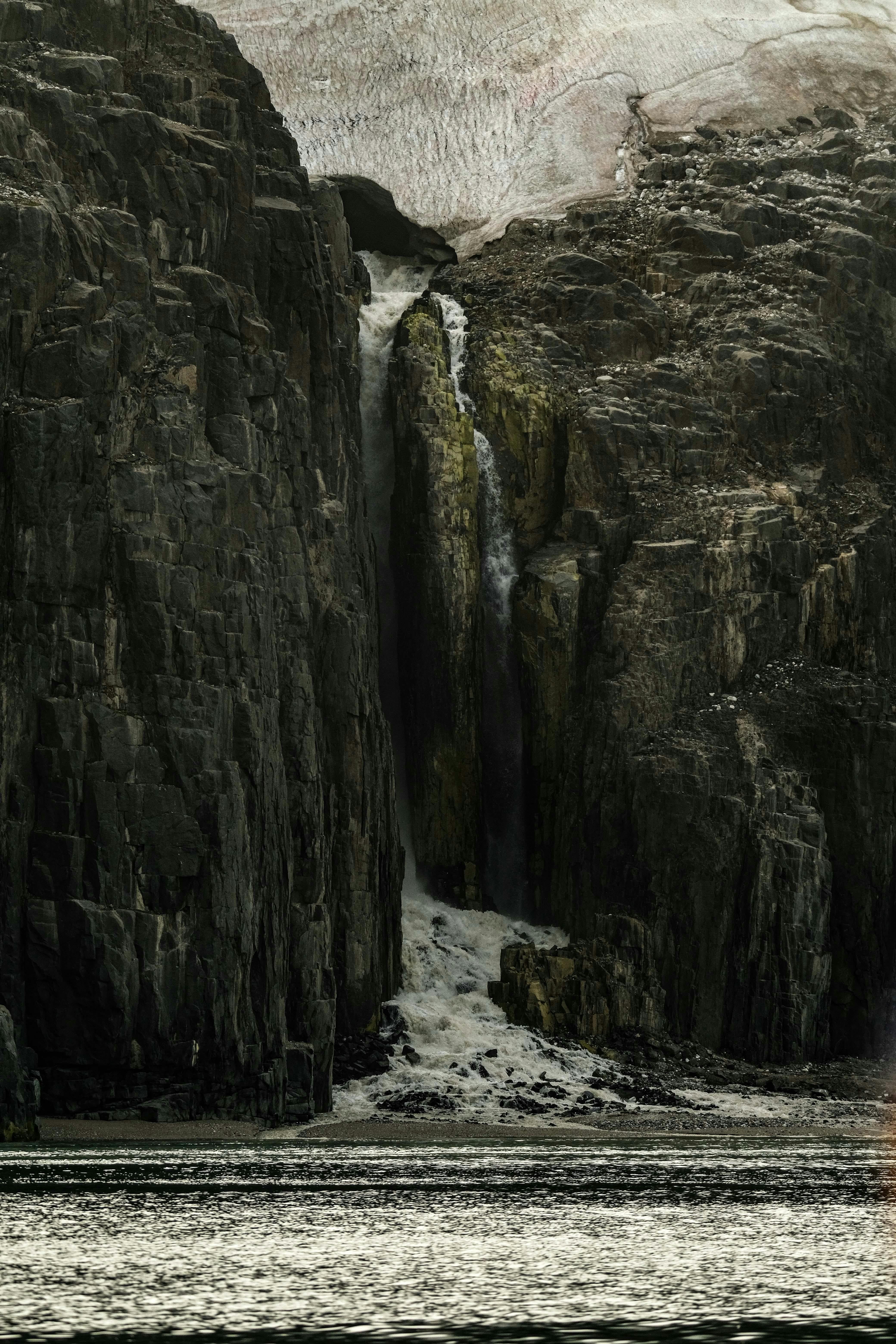 Scenic Rocky Waterfall Reflection · Free Stock Photo