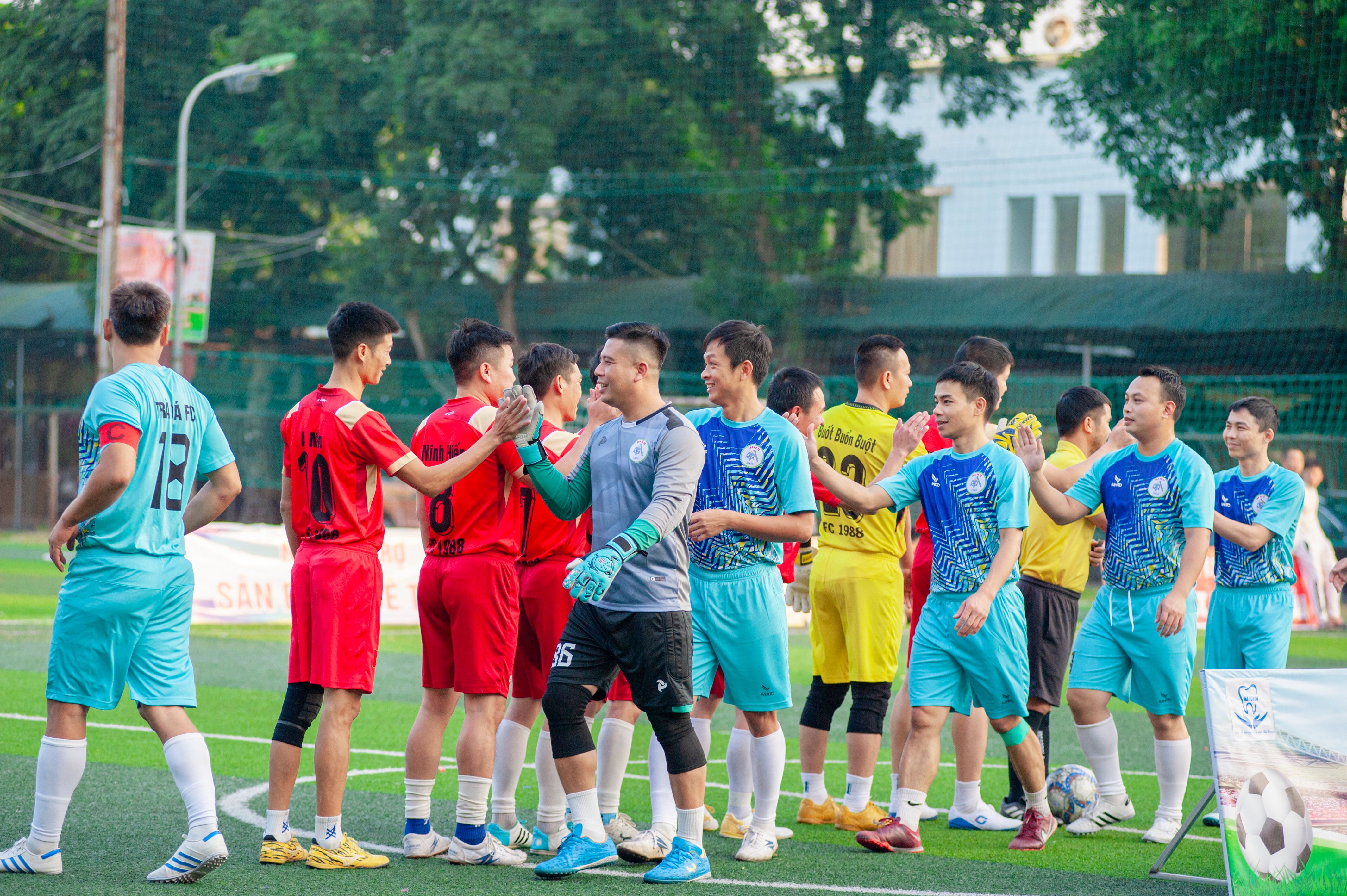 Friendly Soccer Match Teams Shake Hands in Hanoi · Free Stock Photo