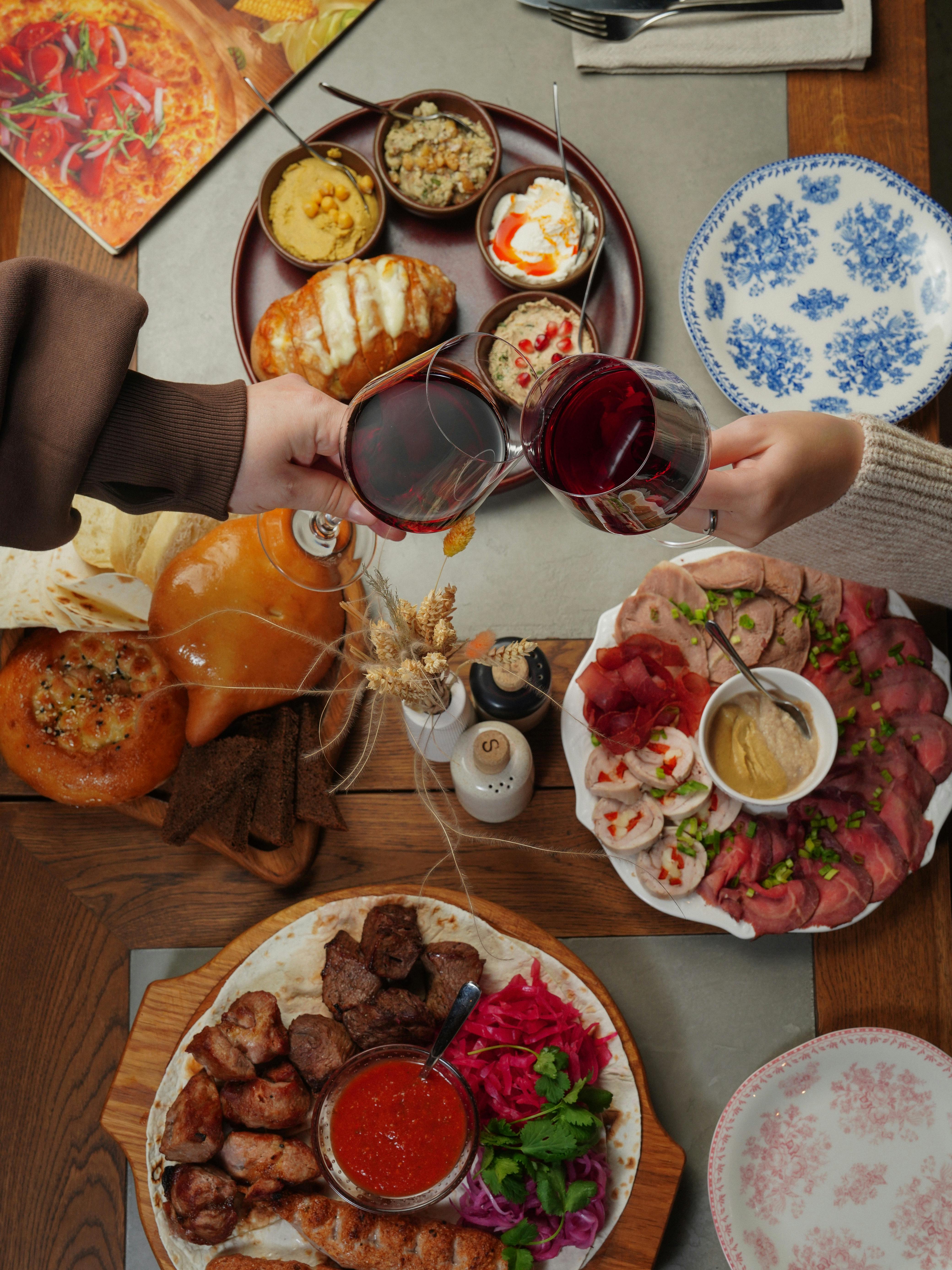 Rustic Lunch with Friends and Wine Cheers · Free Stock Photo