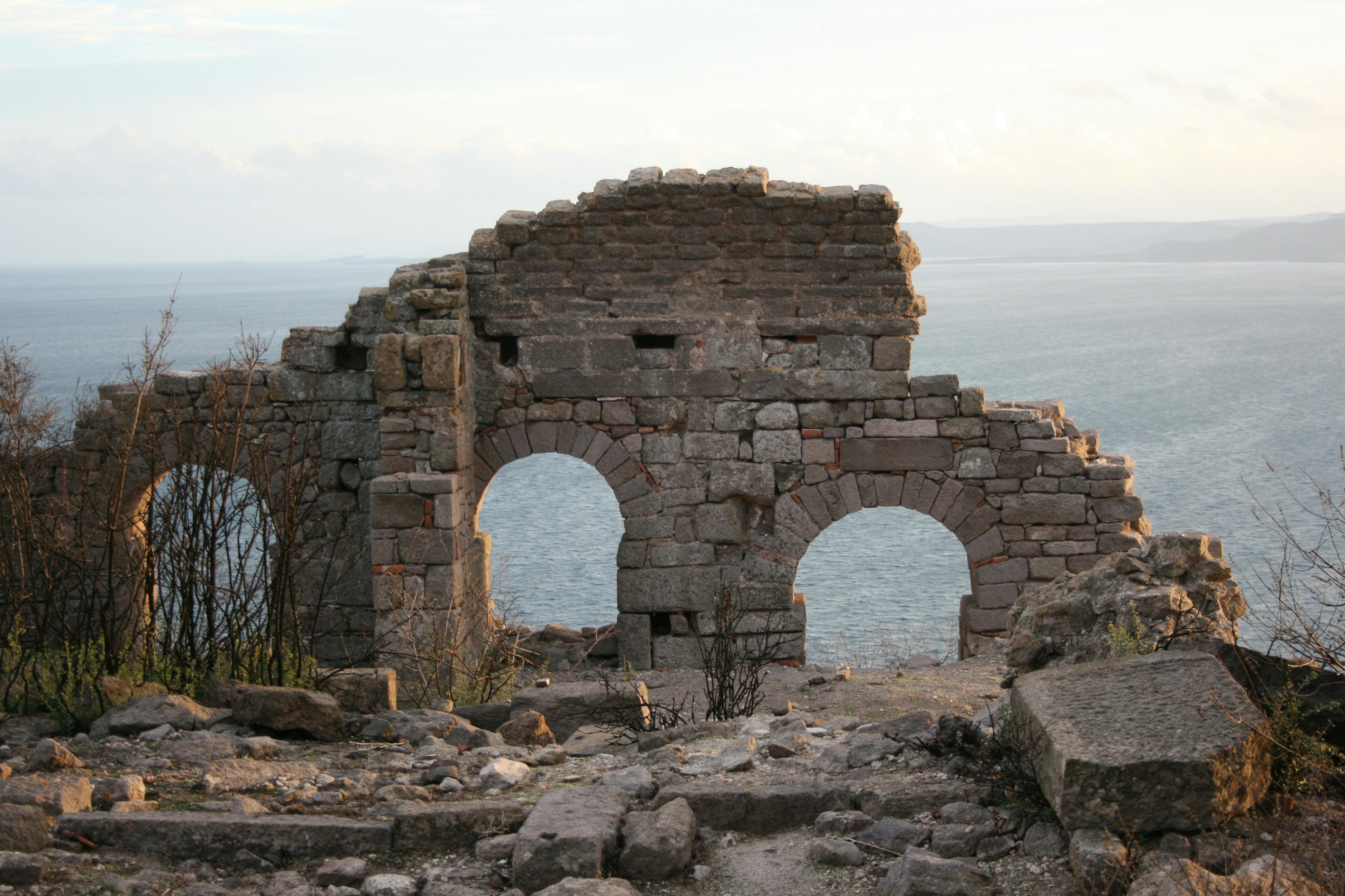 Ancient Stone Ruin Overlooking the Sea · Free Stock Photo