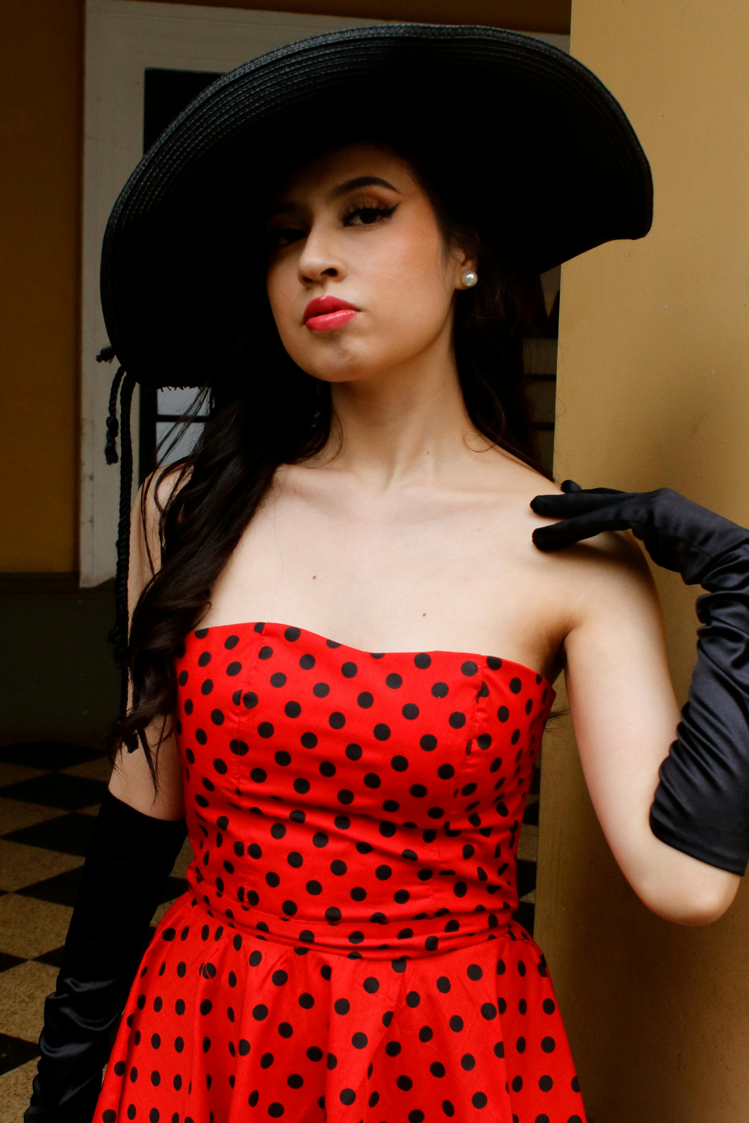 Classic Elegance in 1950s Red Polka Dot Fashion · Free Stock Photo