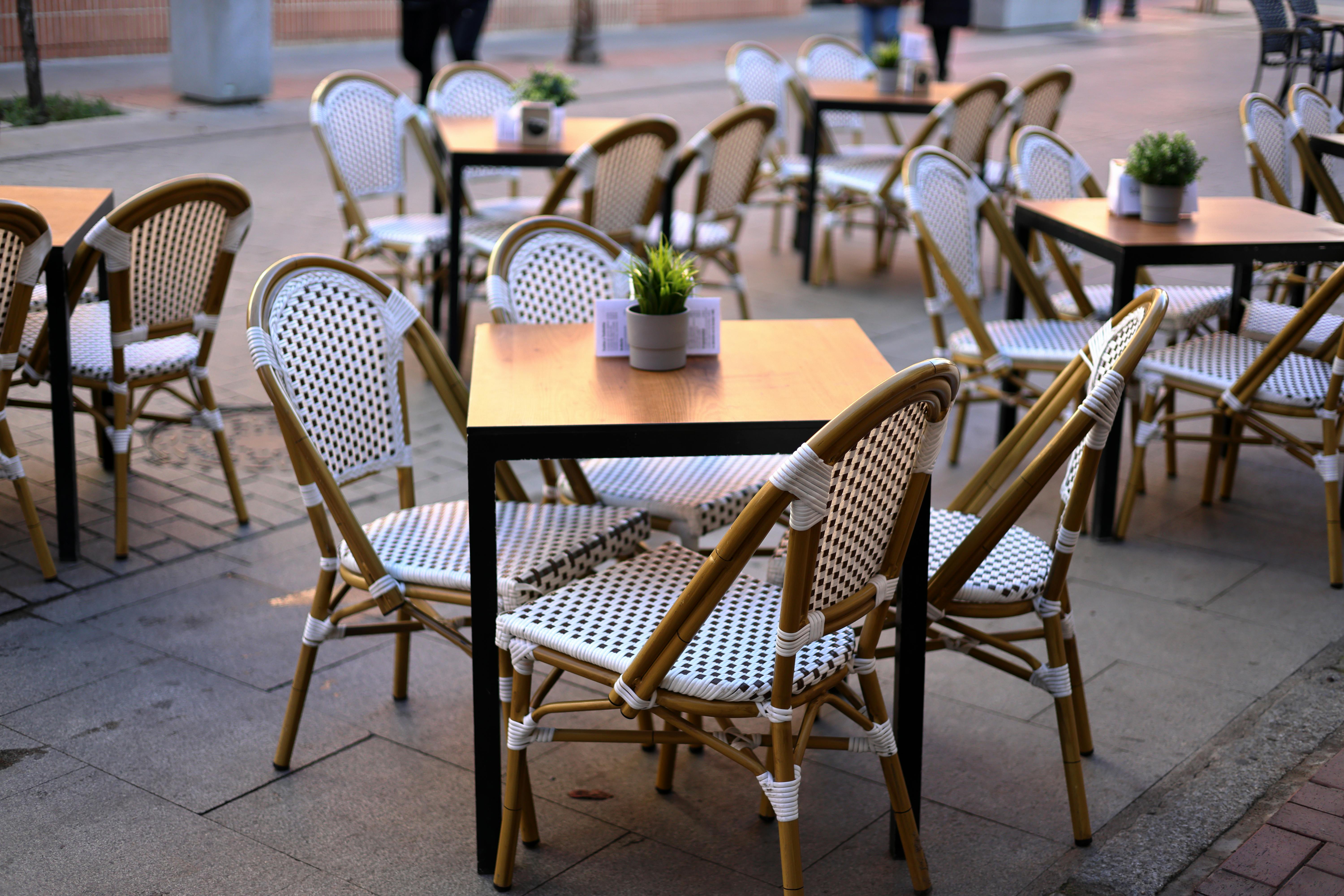 Outdoor Cafe Chairs and Tables in Spain · Free Stock Photo