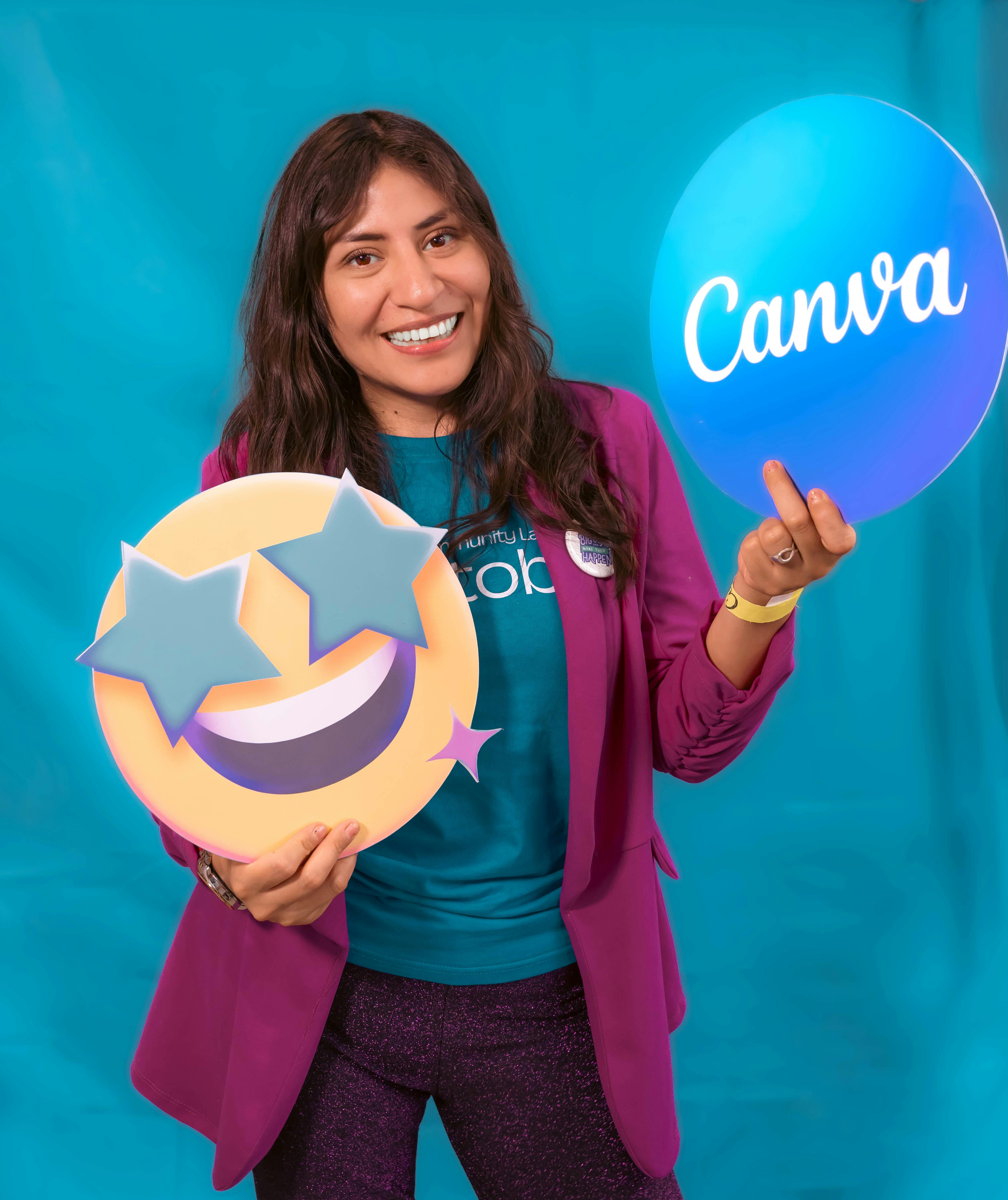 Woman Holding Canva and Emoji Signs Smiling · Free Stock Photo