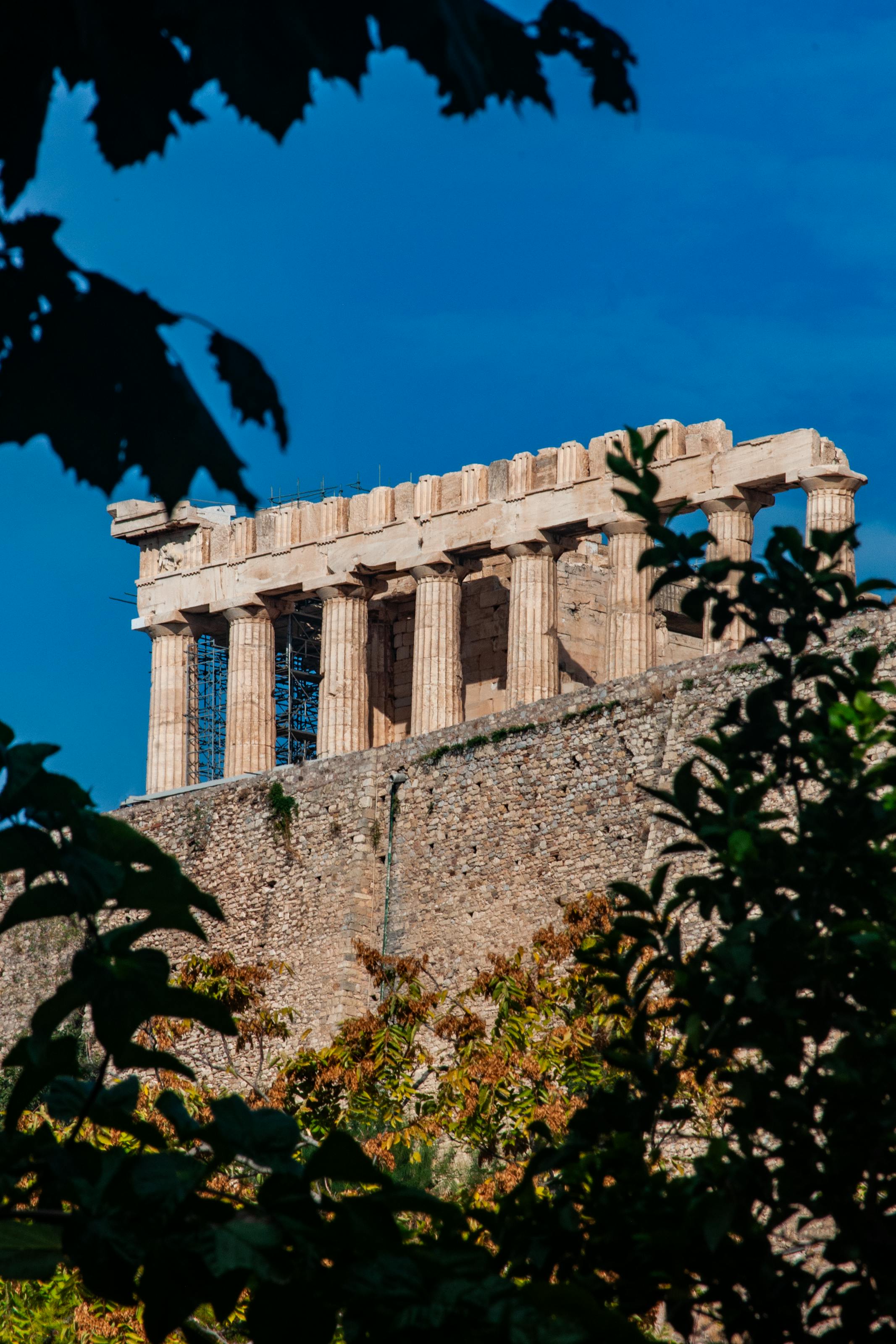 Parthenon in Athens Framed by Foliage · Free Stock Photo